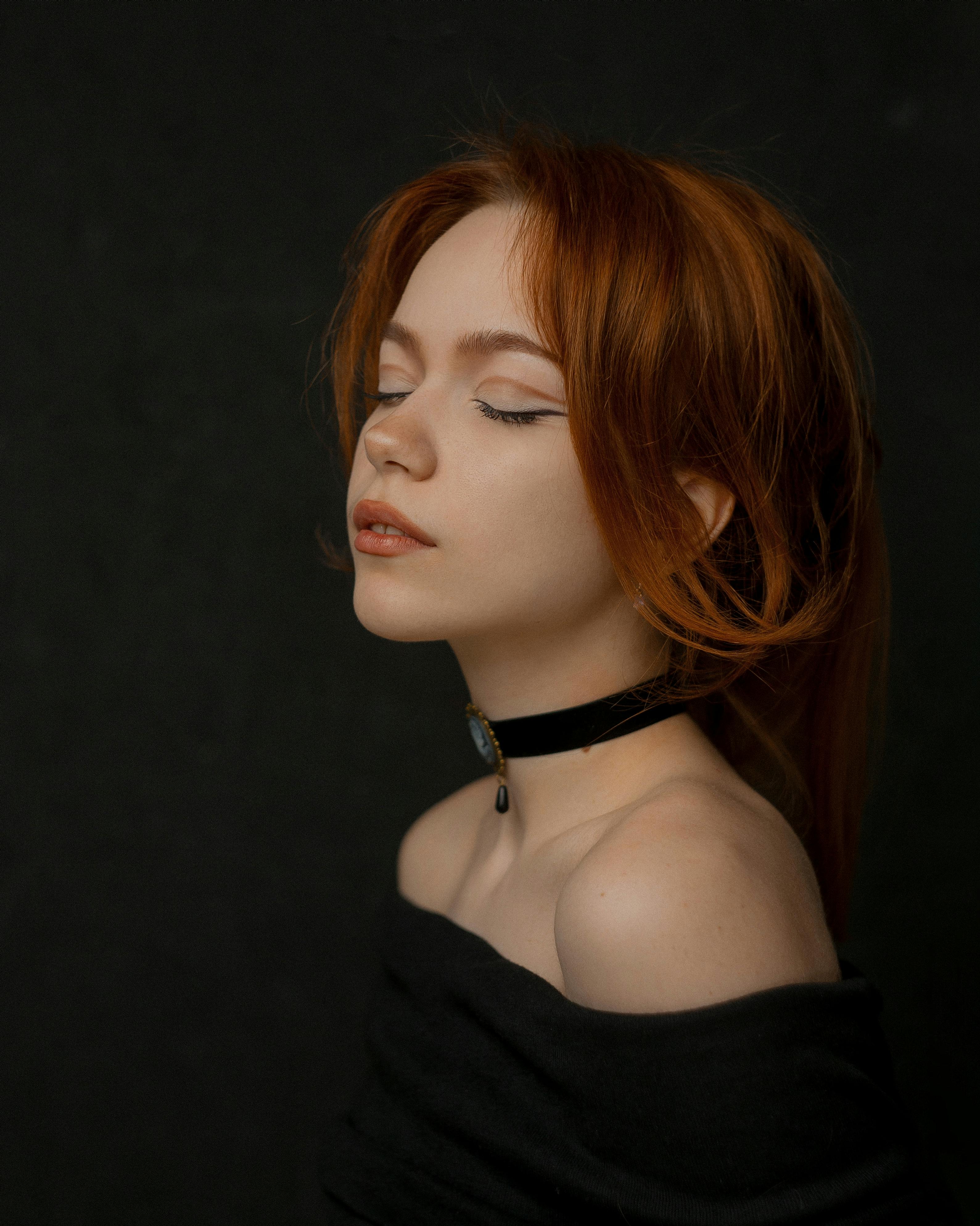 Portrait of Redhead Woman Wearing Choker Necklace · Free Stock Photo