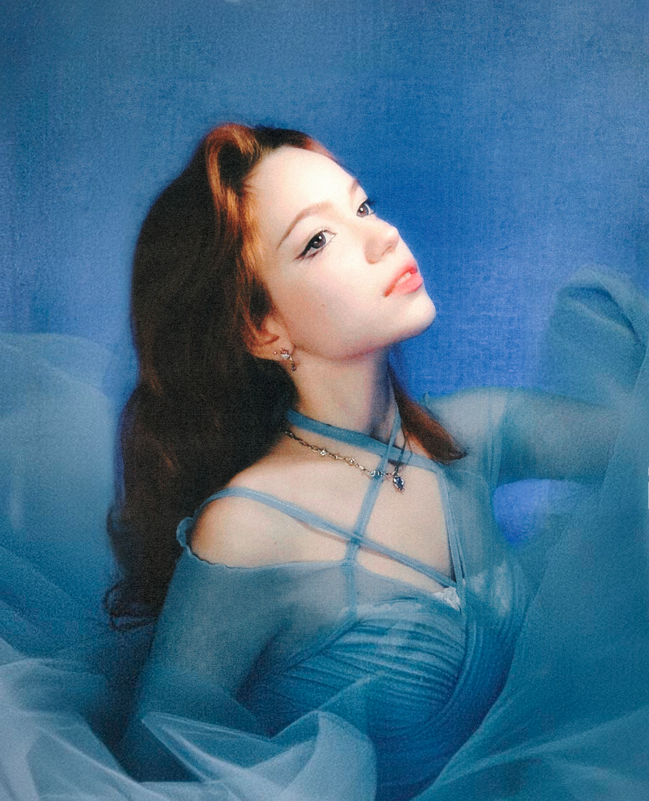 Portrait of Woman in Flowing Blue Dress · Free Stock Photo