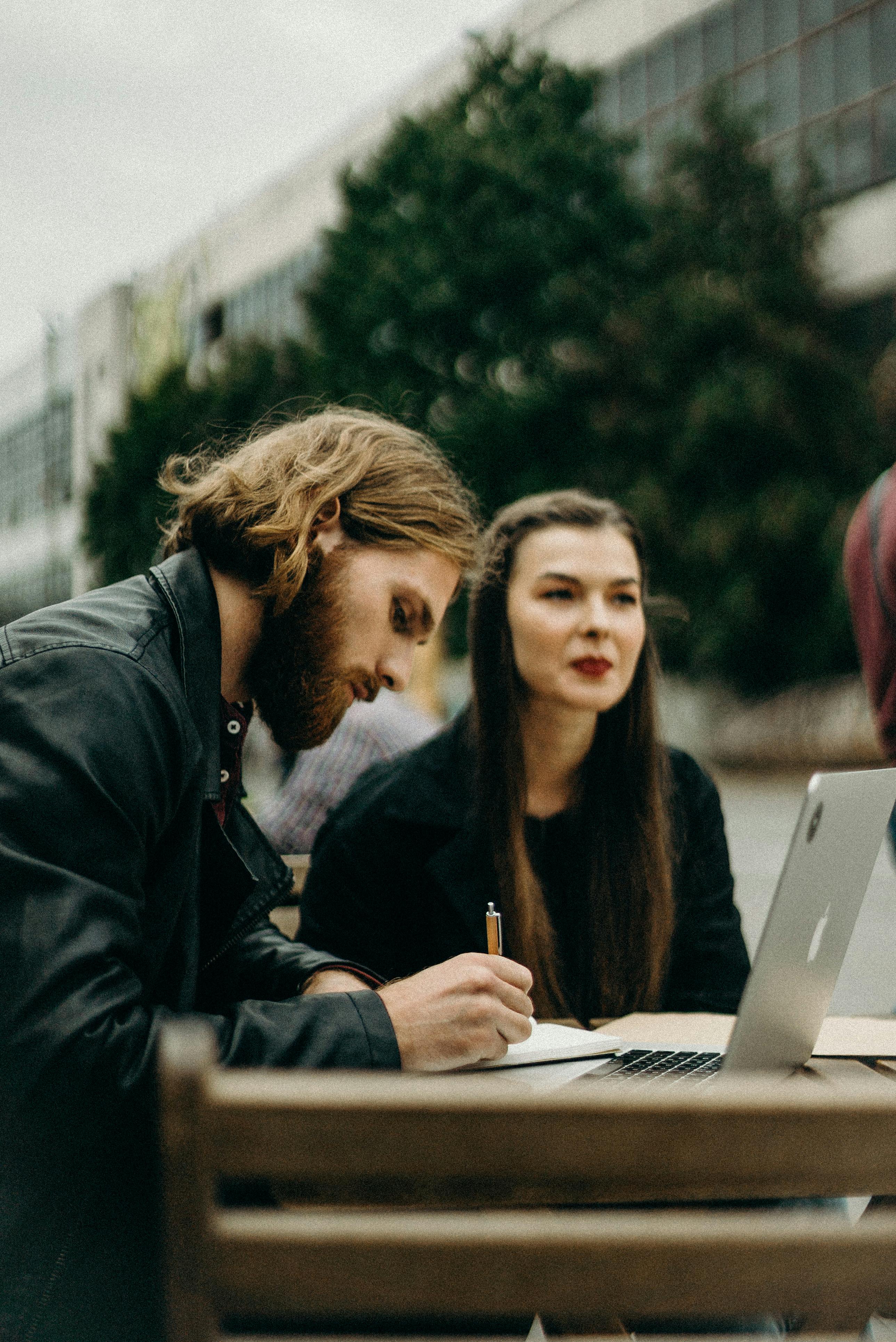 Photo Of People Sitting Near Each Other · Free Stock Photo