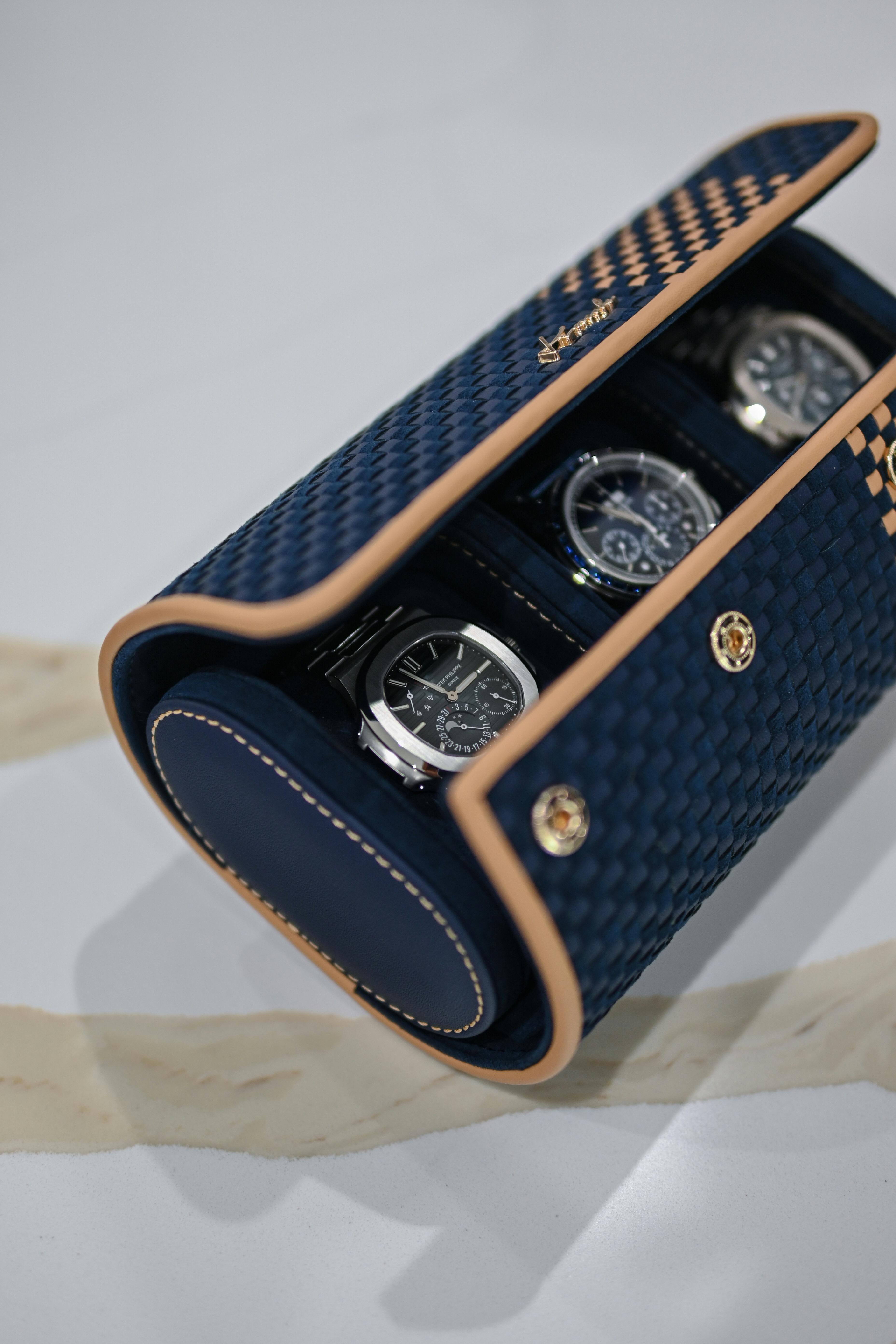 A watch case with three watches in it · Free Stock Photo