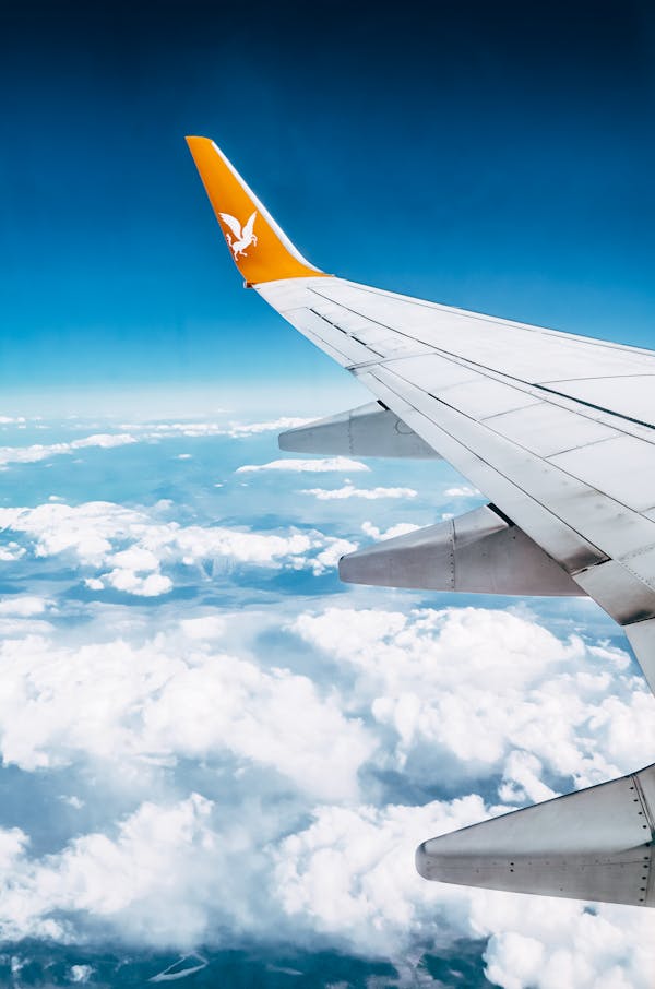 Airplane Wing Above Clouds · Free Stock Photo Airplane Wing Above Clouds · Free Stock Photo