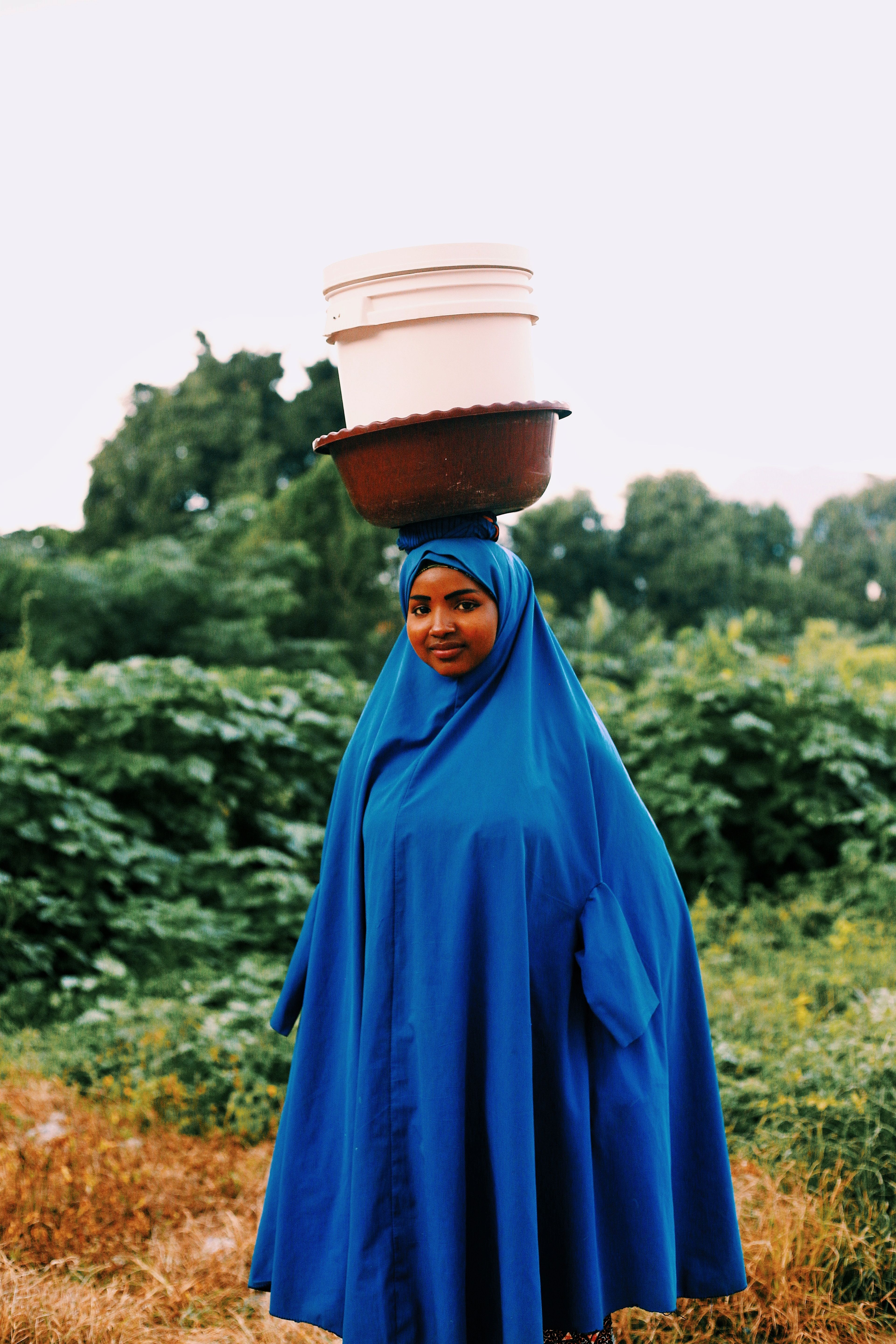 Woman Posing in a Traditional Blue Chador Headscarf Head-Carrying ...