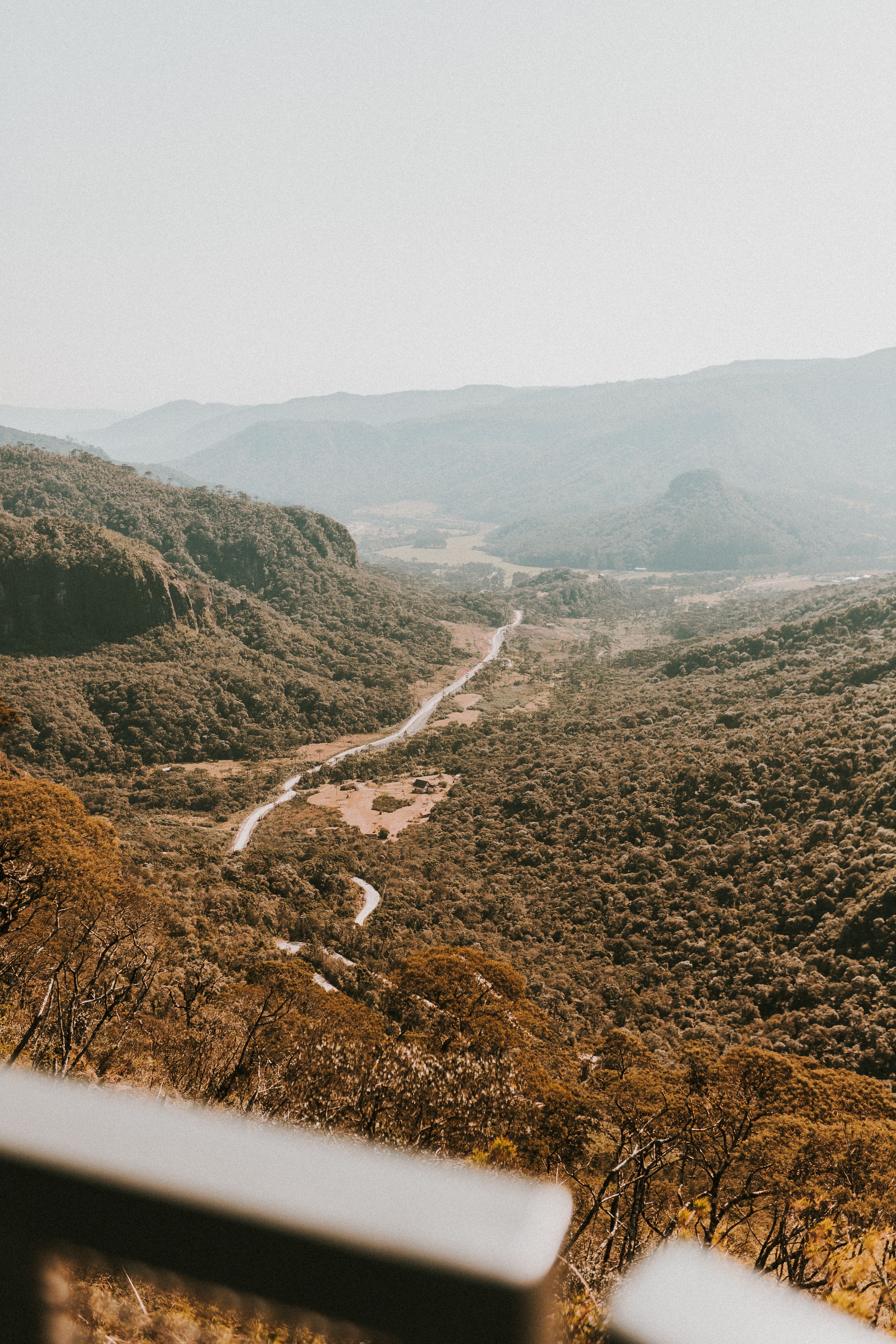 A view of a valley and mountains from a balcony · Free Stock Photo