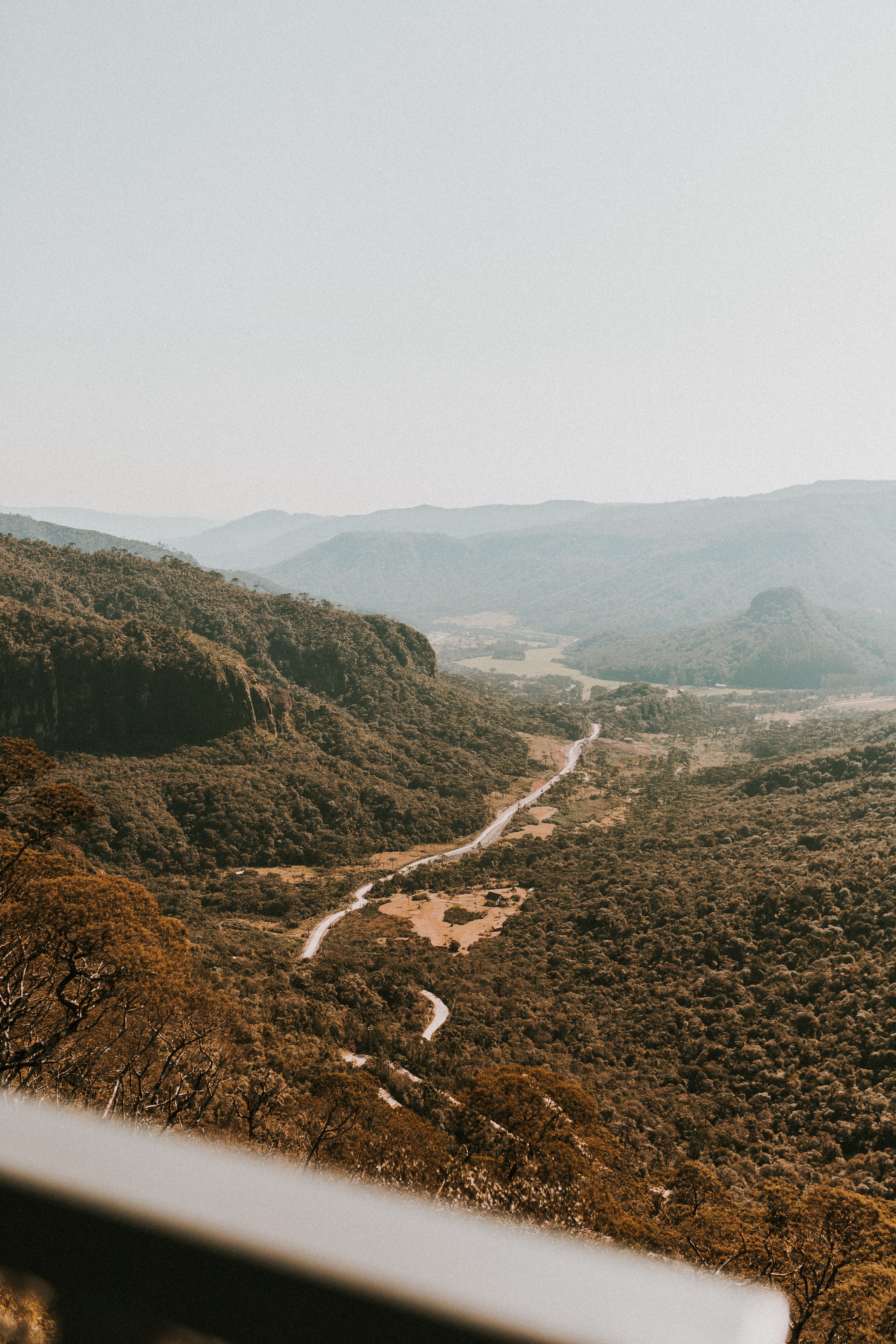 A view of a valley and mountains from a balcony · Free Stock Photo