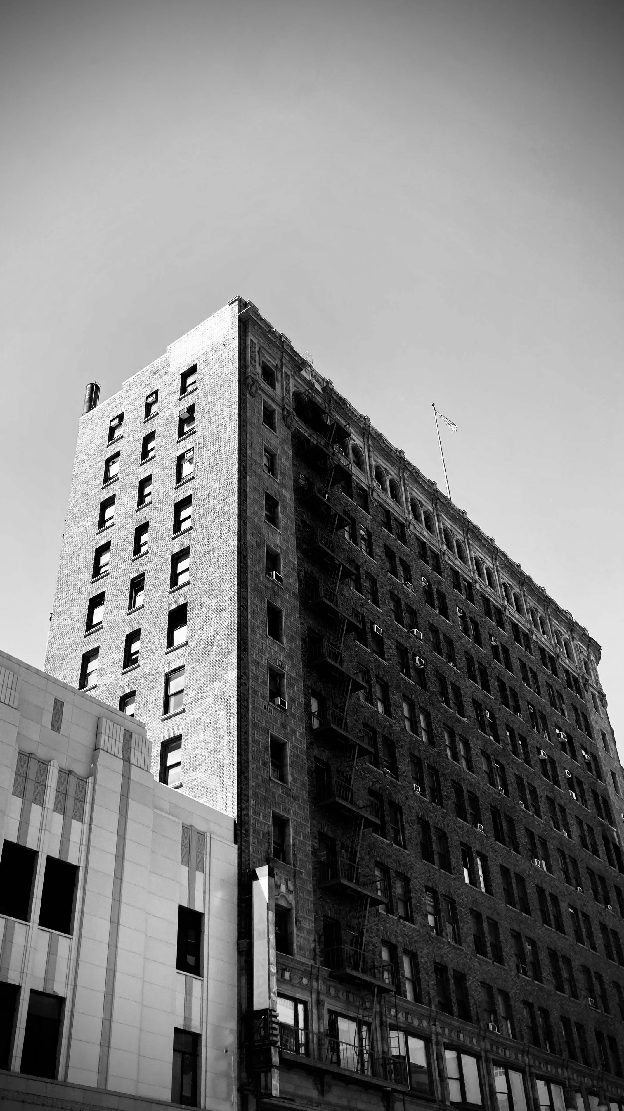 Greyscale Photography of High Rise Building · Free Stock Photo