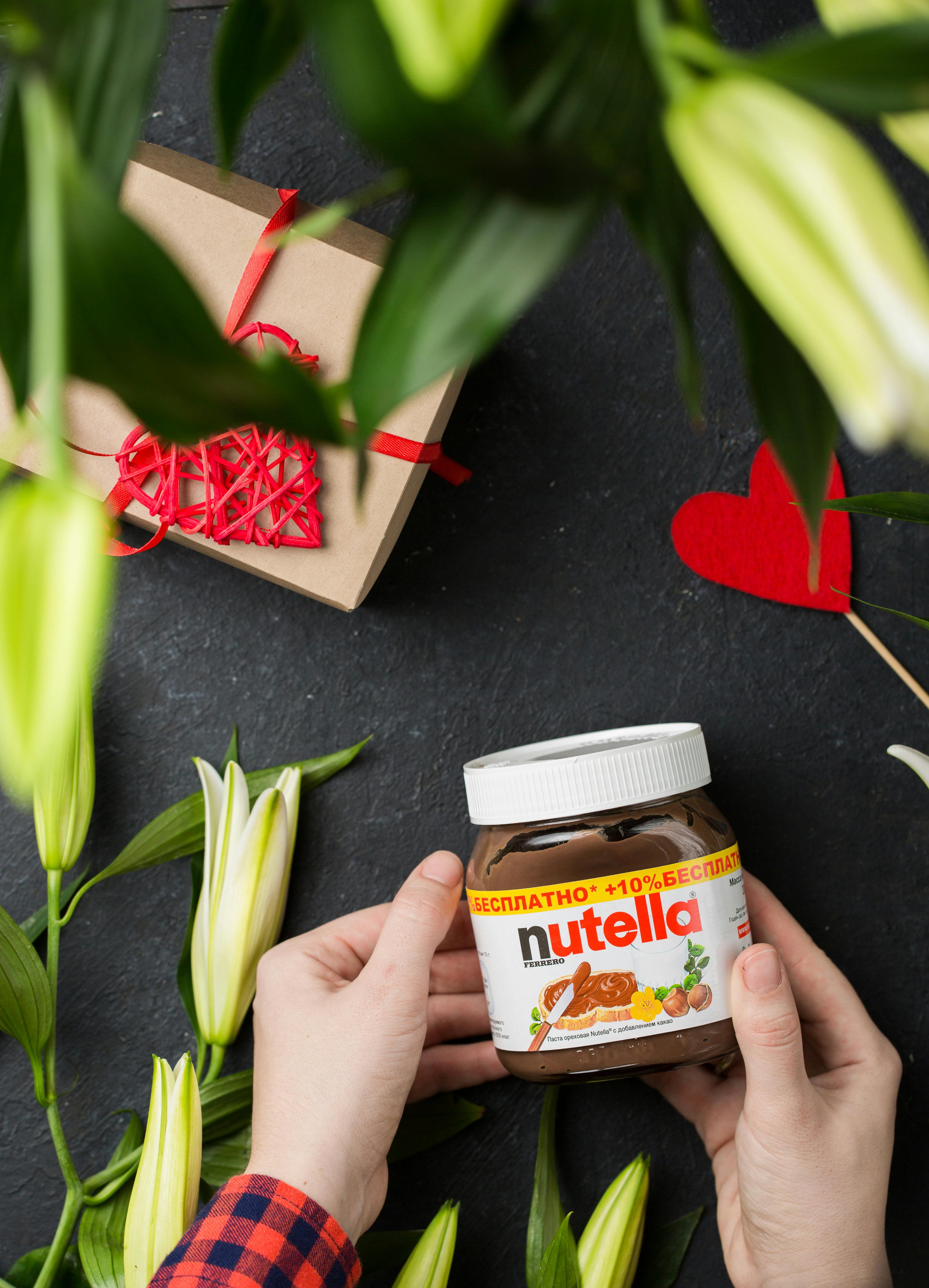Person Holding Nutella · Free Stock Photo