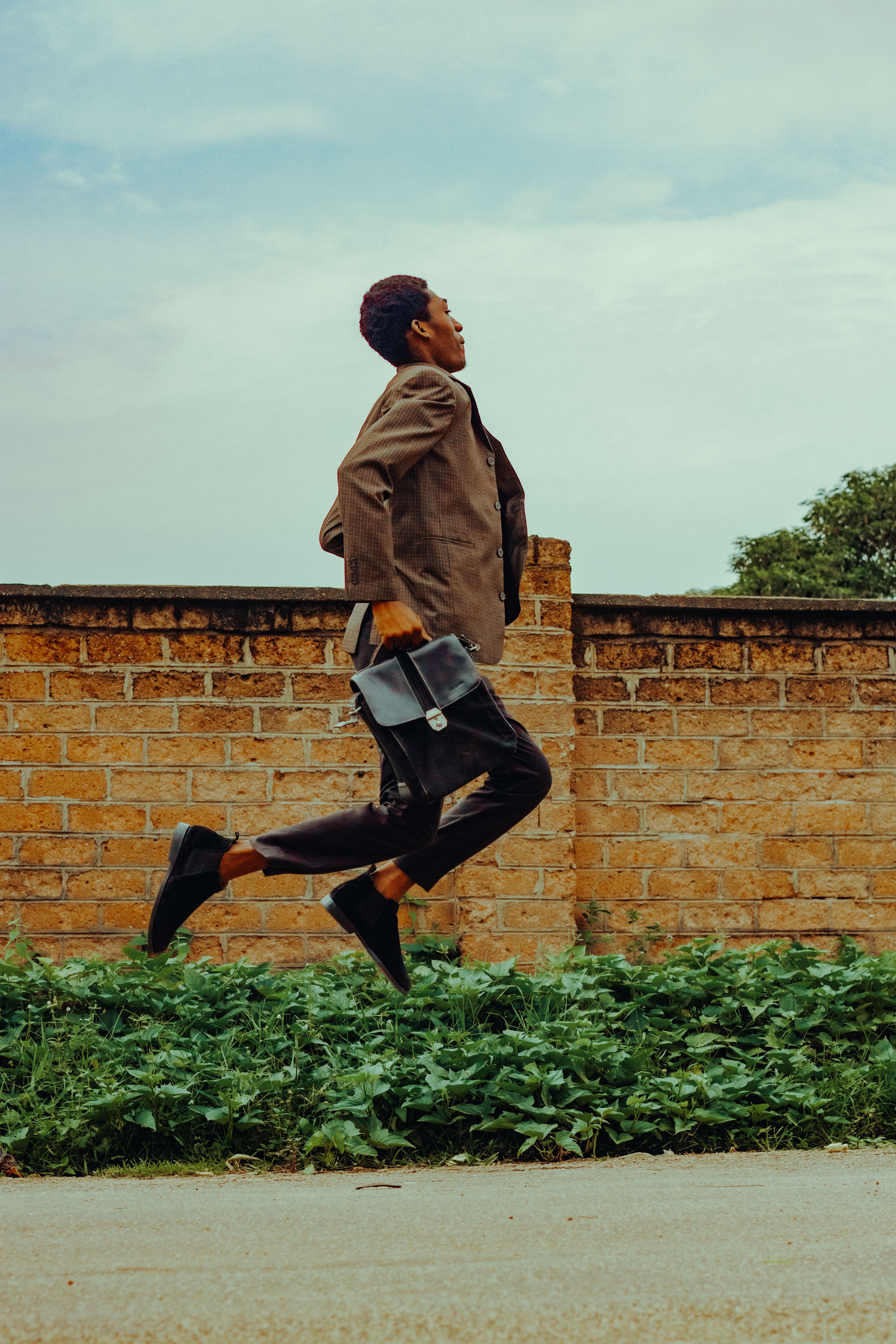 Jumping Man with a Briefcase · Free Stock Photo