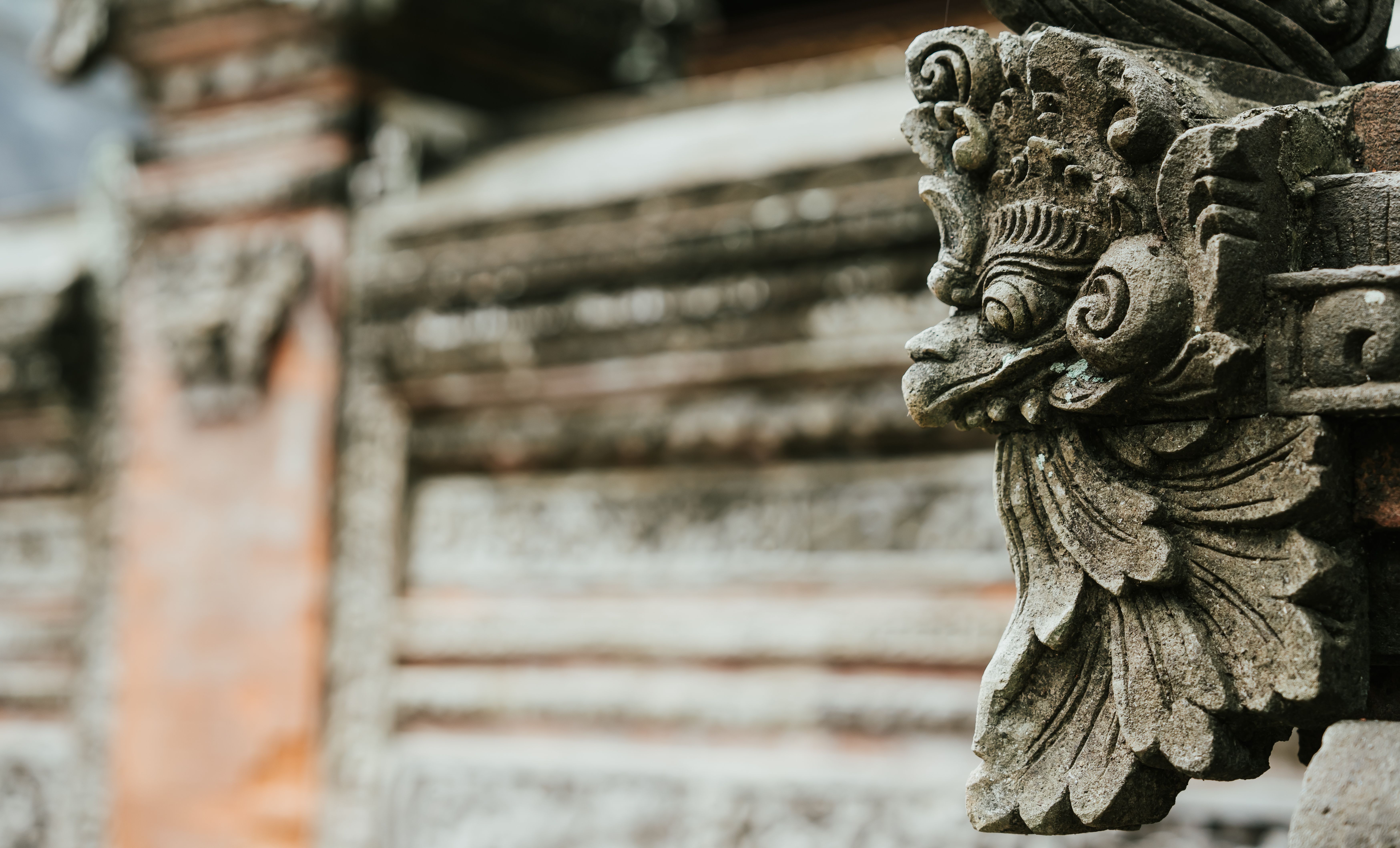 A close up of a stone carving on a building · Free Stock Photo