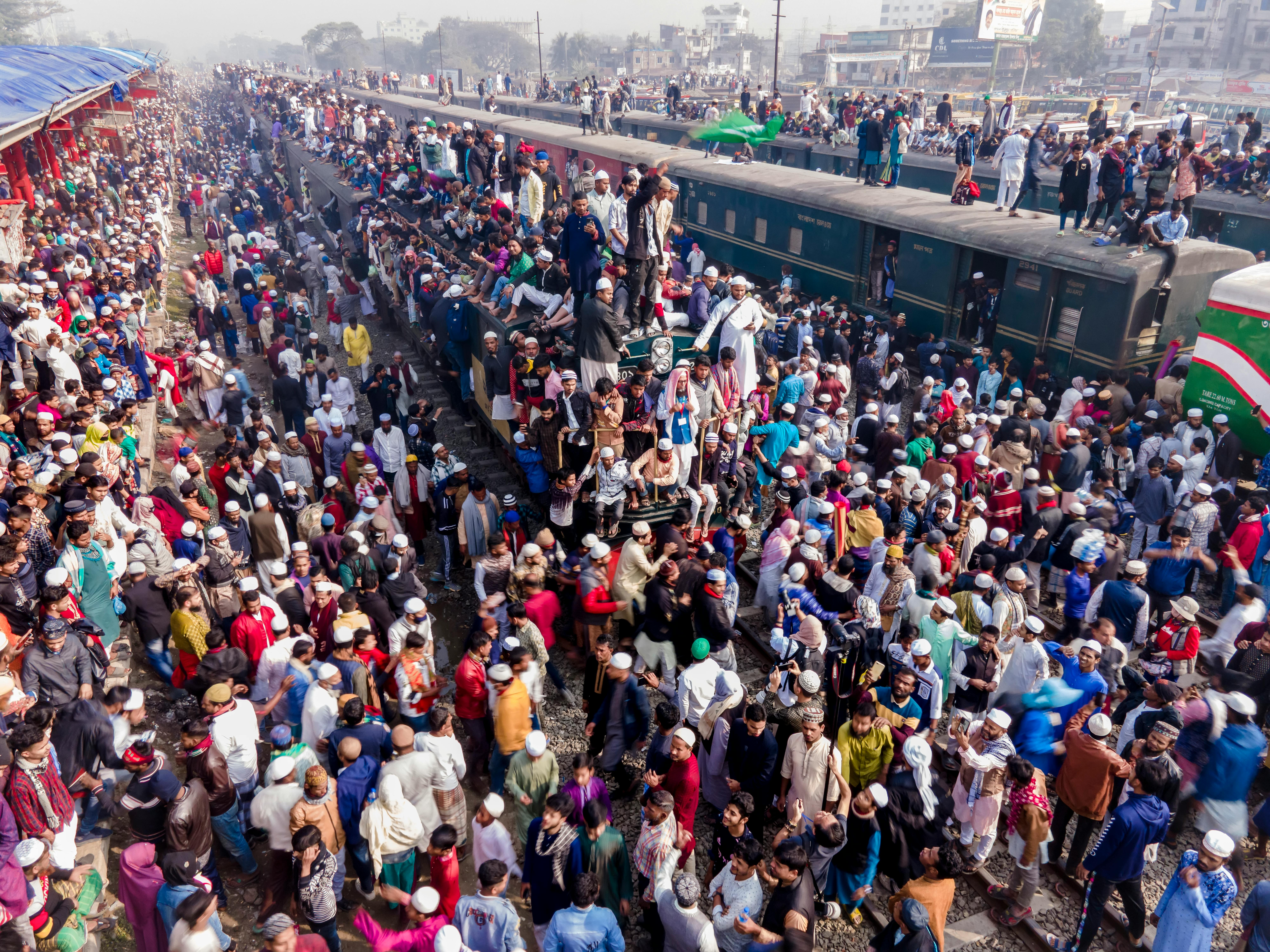 A large crowd of people standing on a train · Free Stock Photo