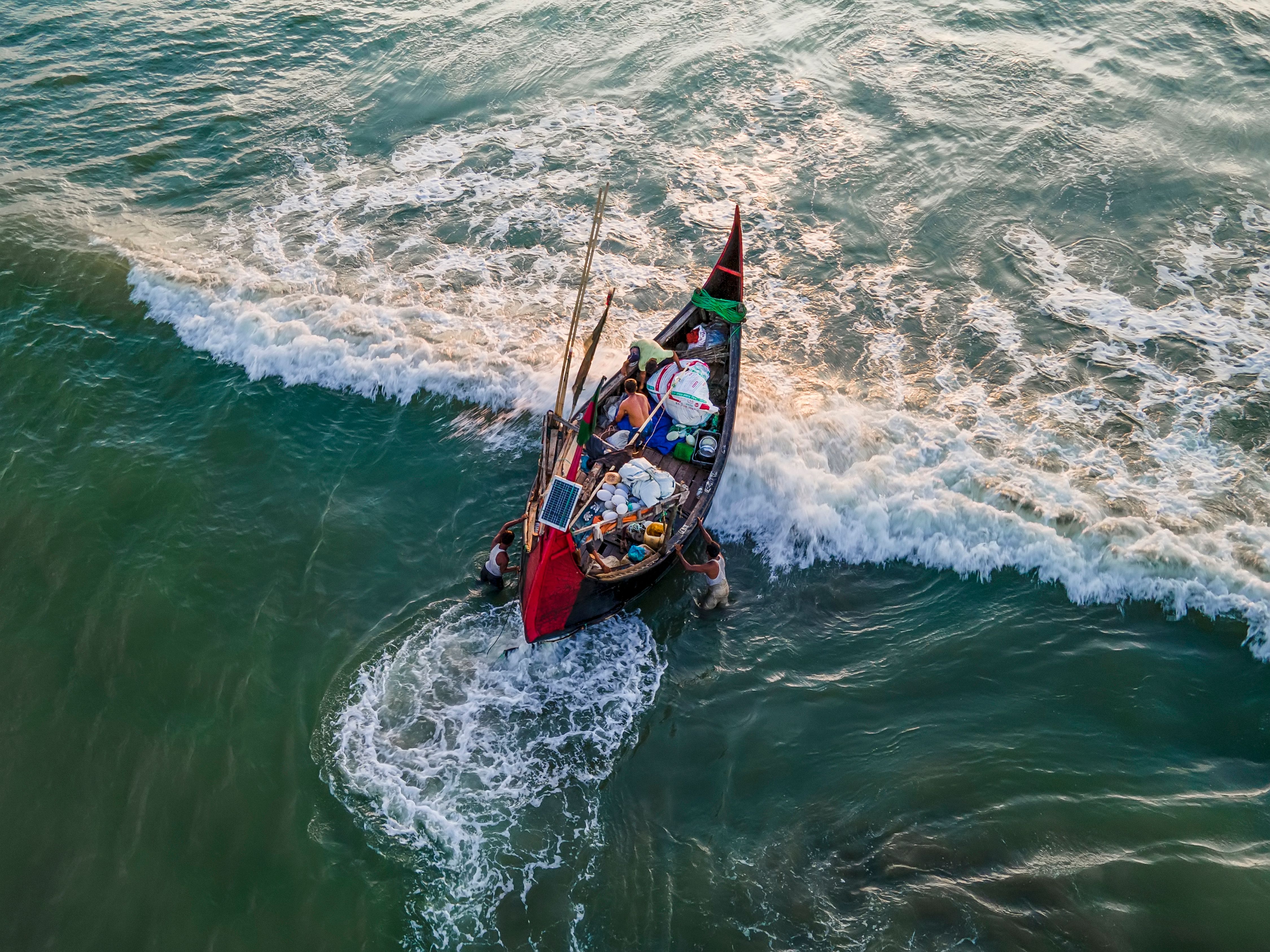 Aerial View of Traditional Fishing Boat at Sea · Free Stock Photo