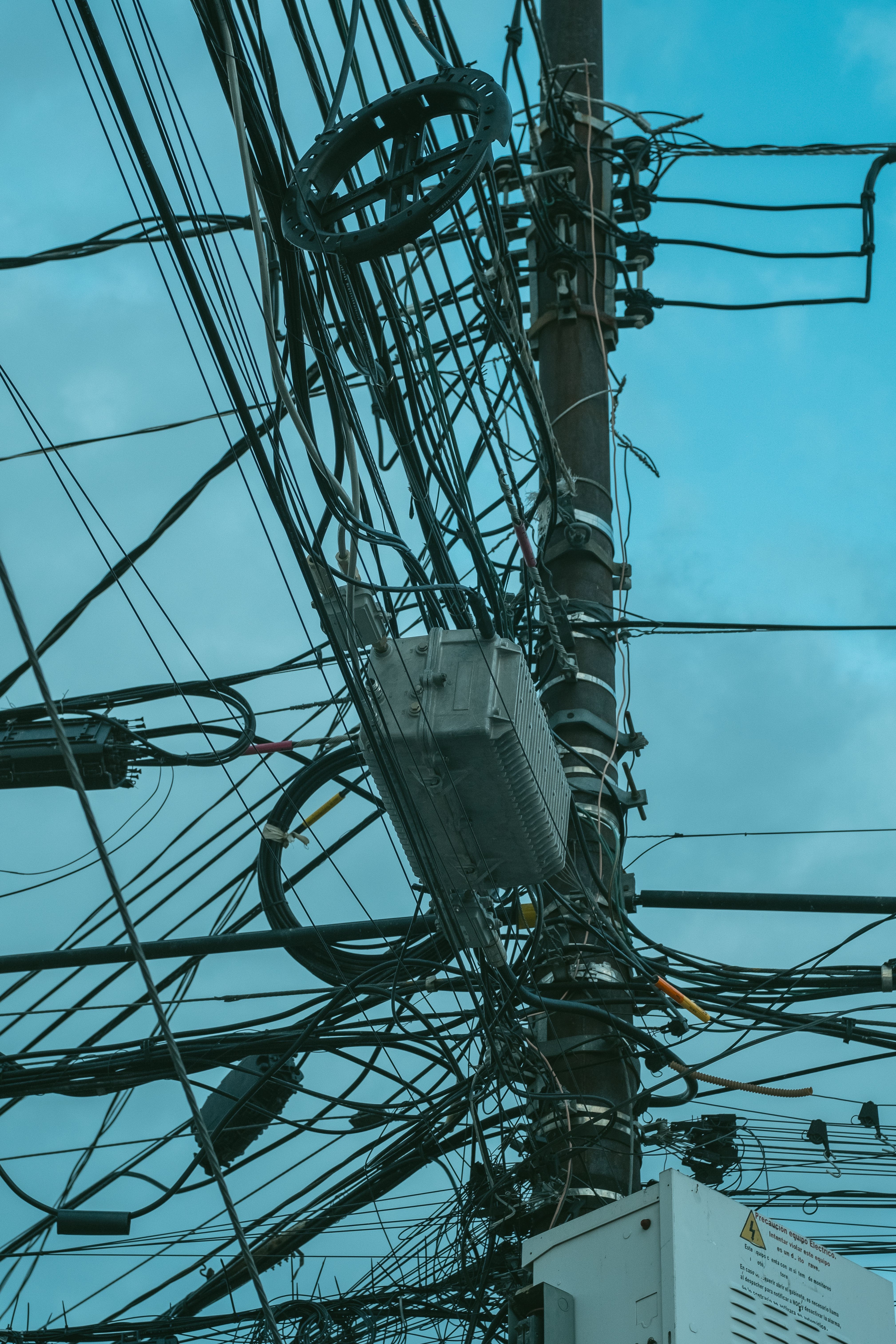 A power pole with wires and electrical equipment · Free Stock Photo