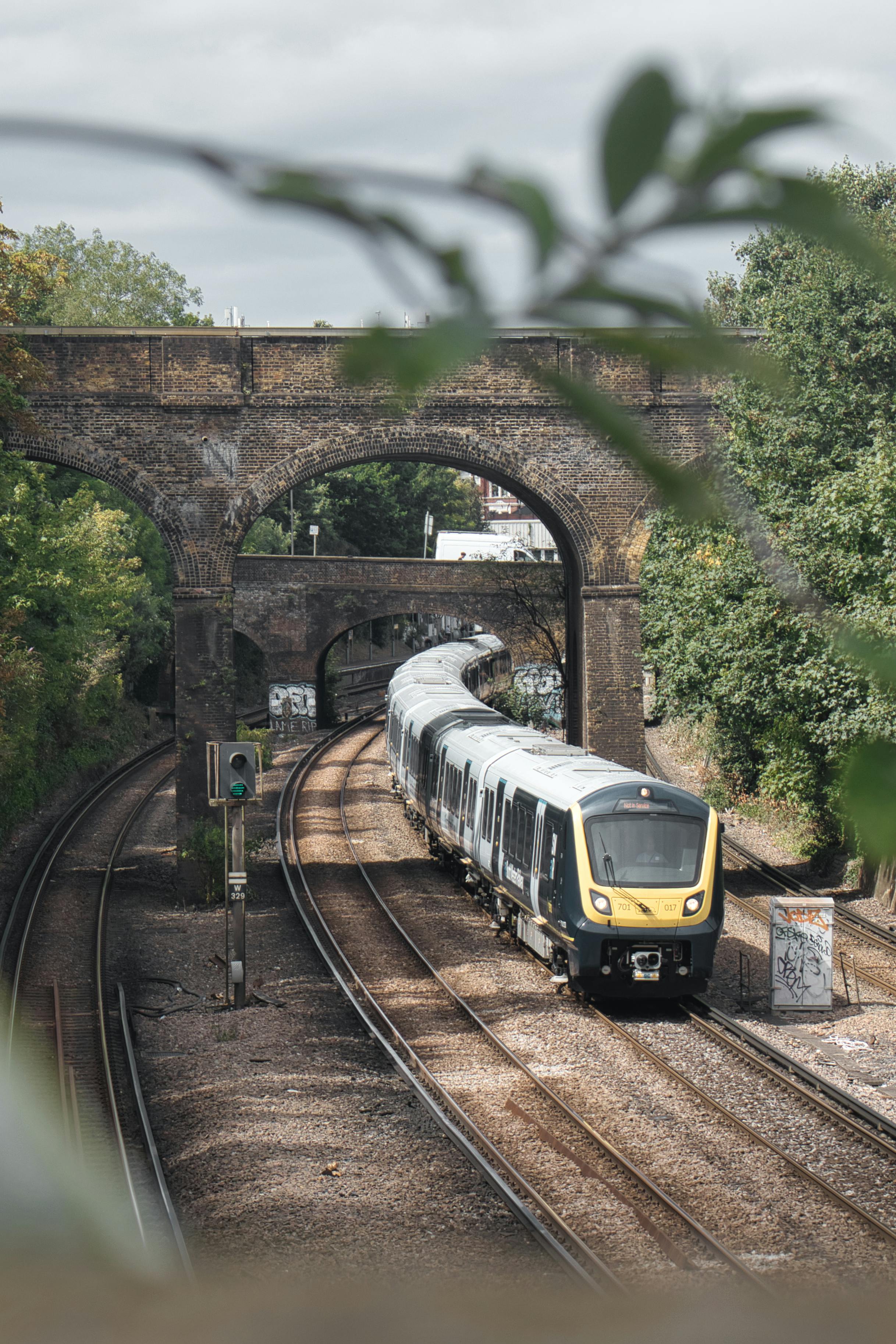A commuter train passes through Putney, in south-west London · Free ...