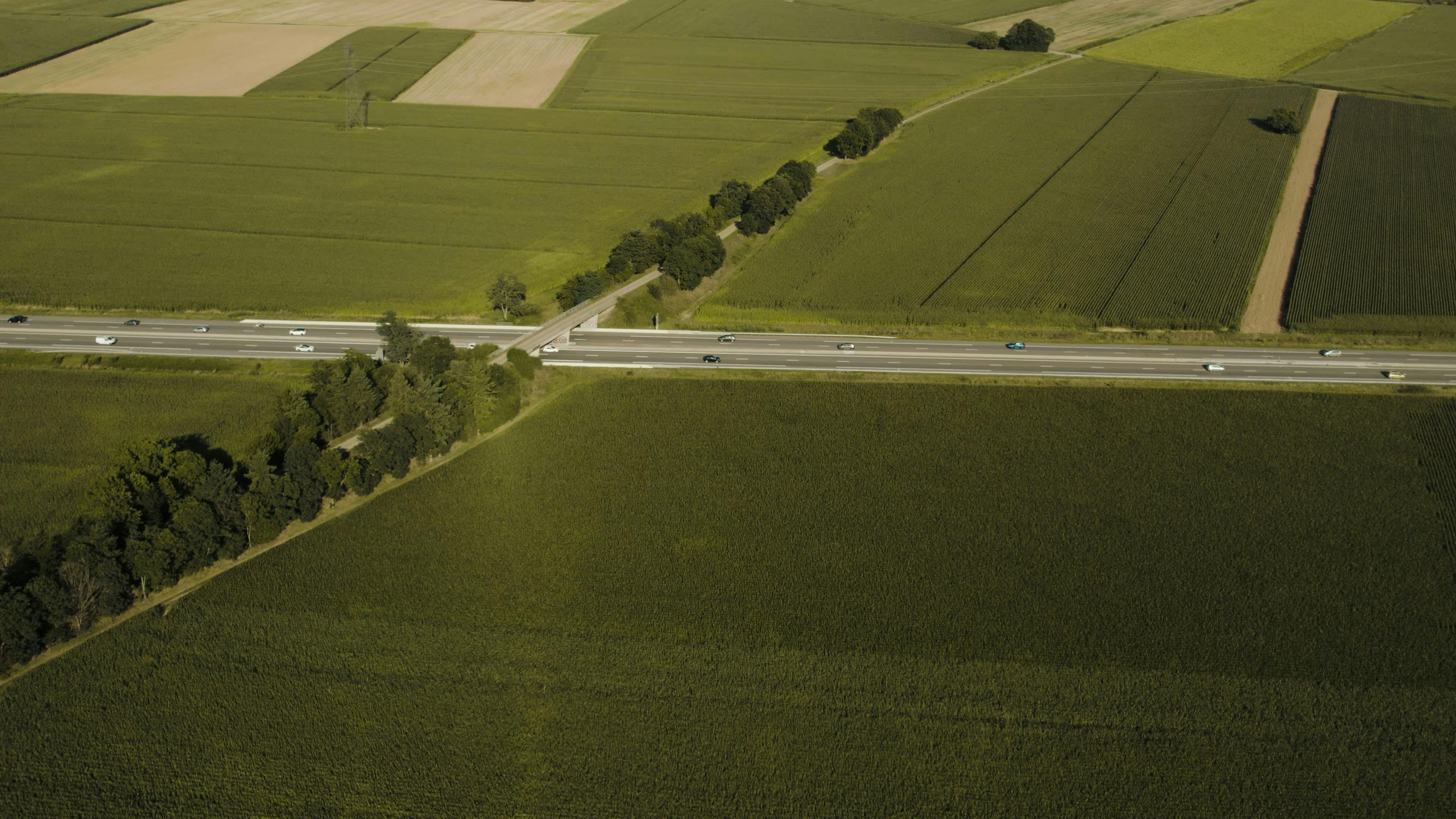 Aerial view of a highway and a field · Free Stock Photo
