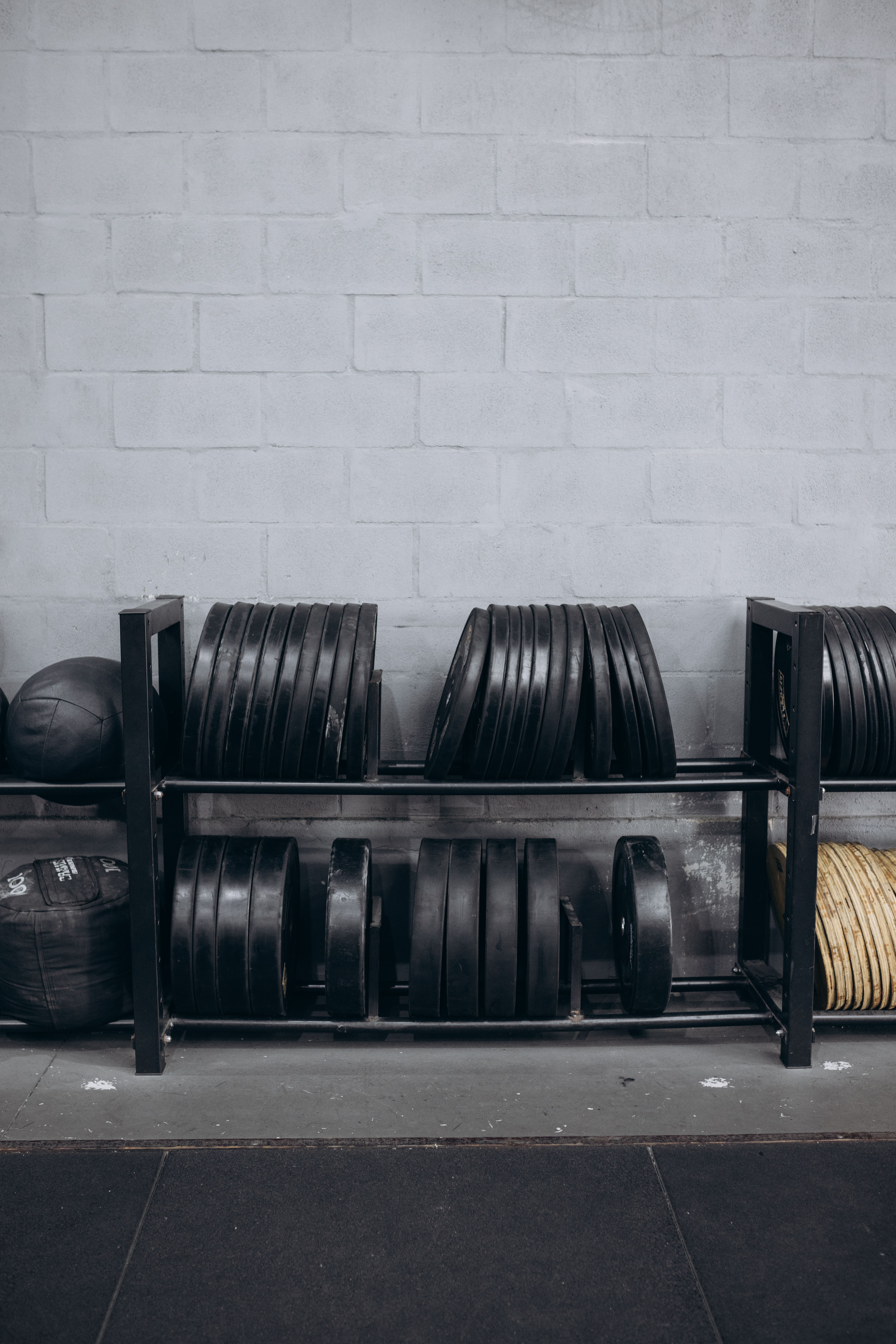 A rack of weights in a gym · Free Stock Photo
