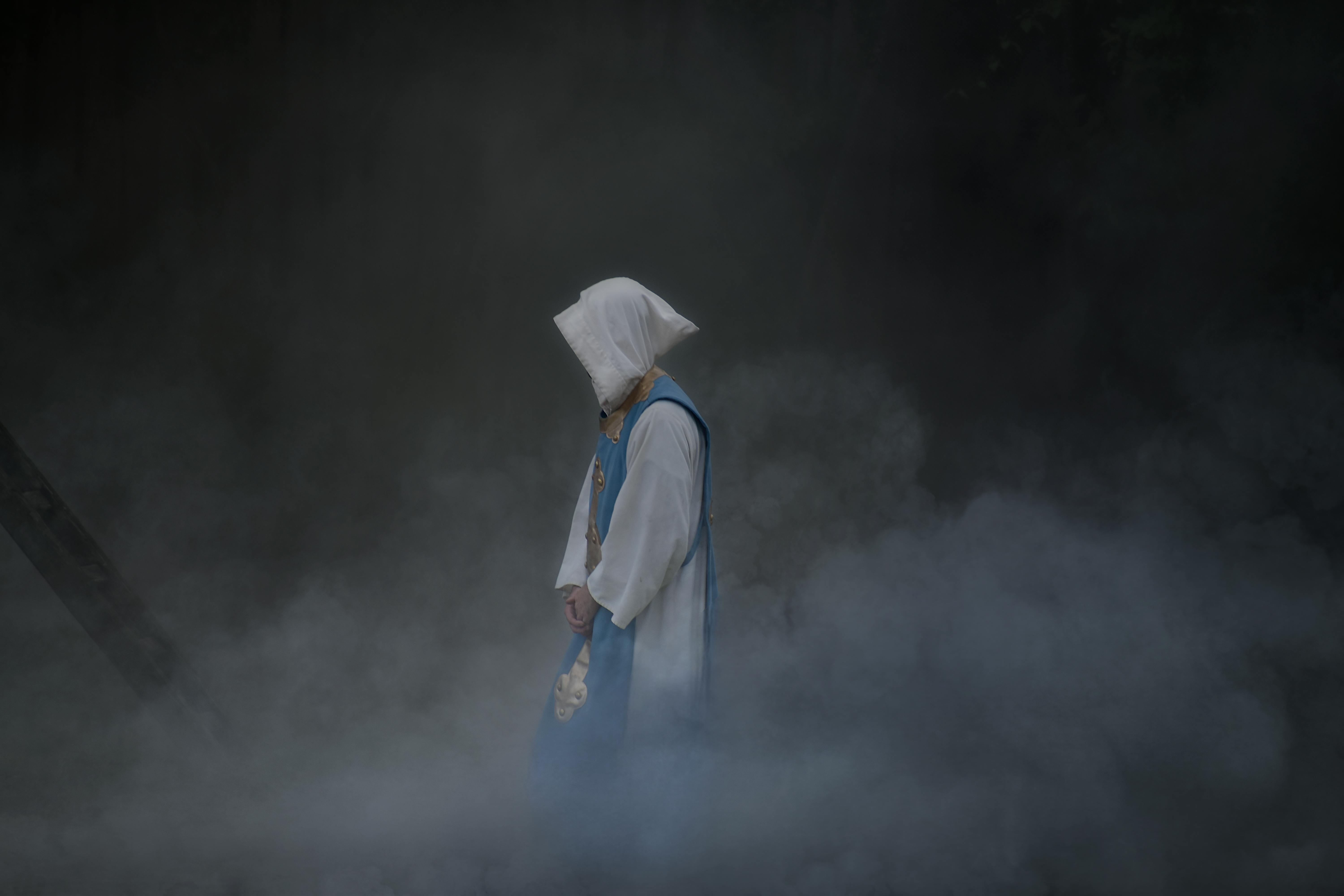 Silhouette of Man Standing Against Black And Red Background · Free ...