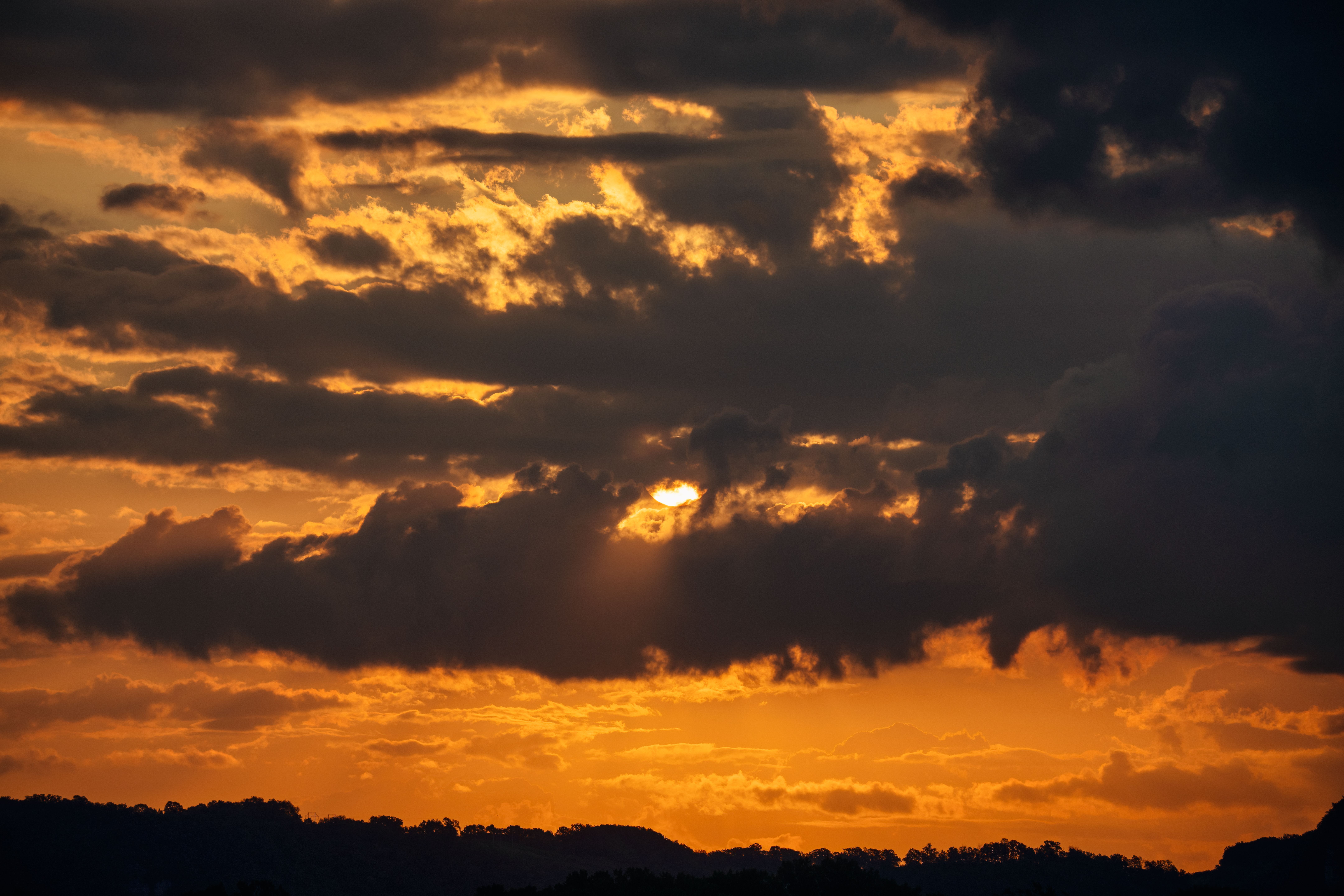 Sunset View Covered by Cloudy Sky · Free Stock Photo