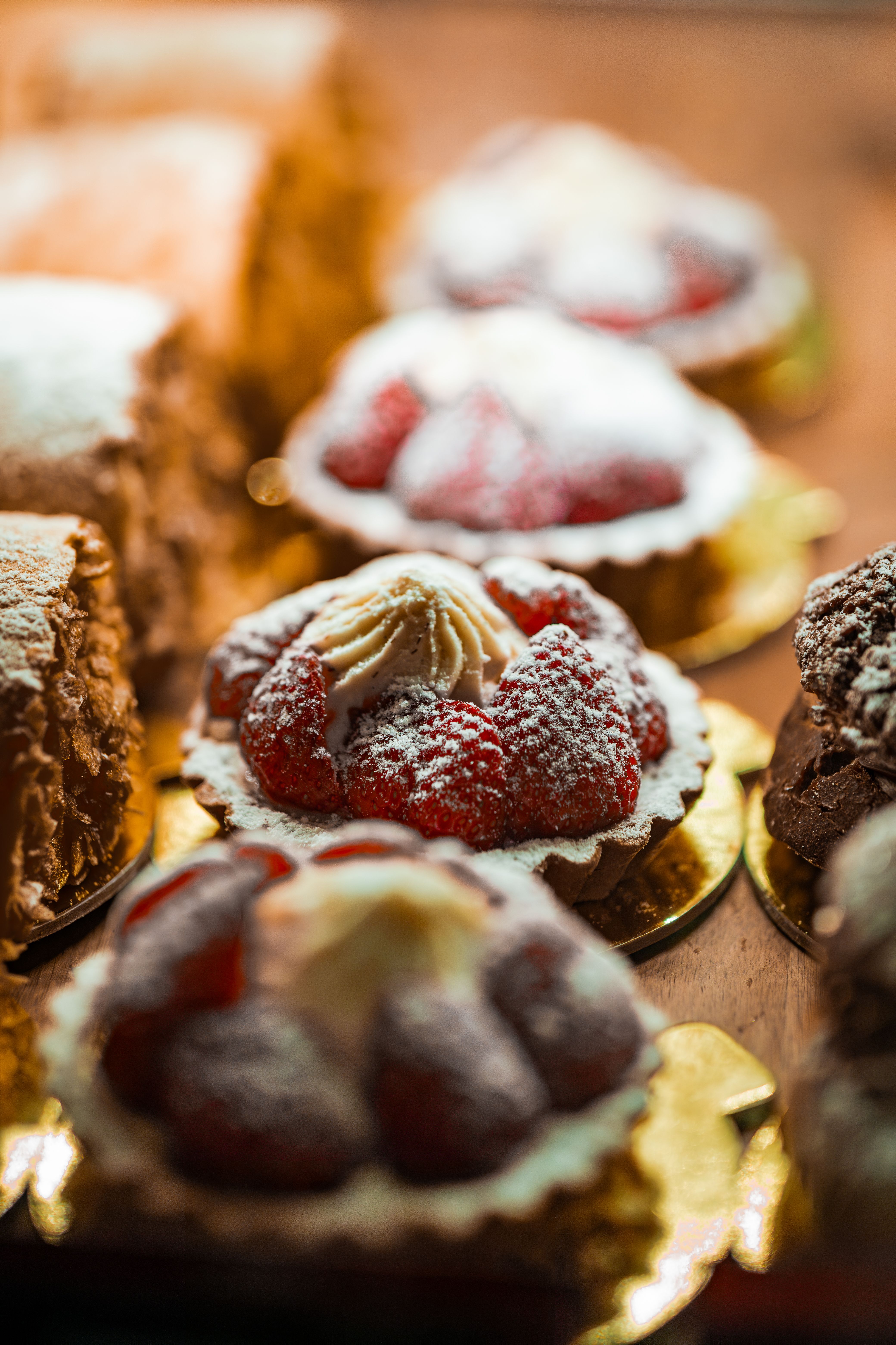 A display of pastries with different flavors · Free Stock Photo