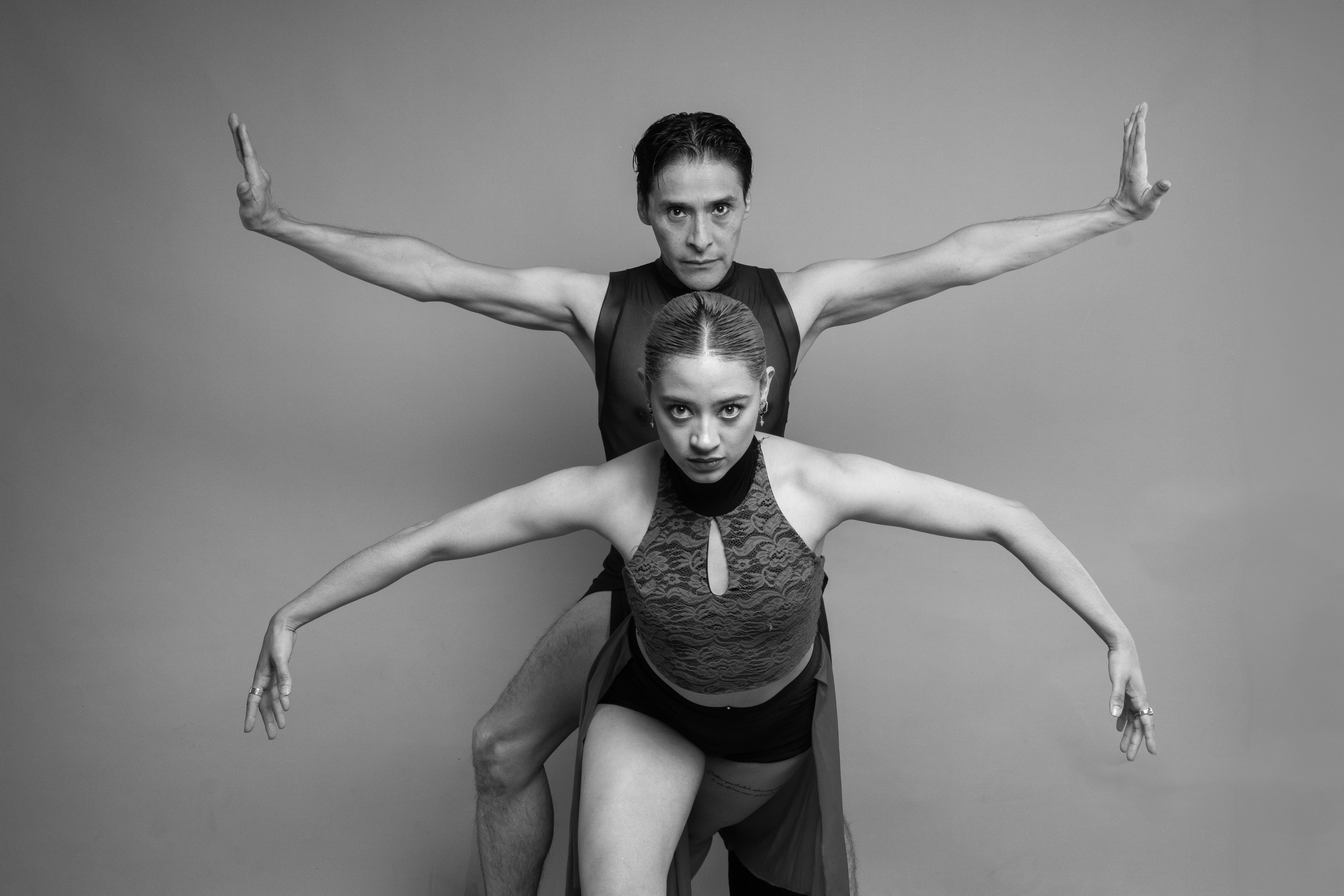 Two dancers in red dresses pose for a photo · Free Stock Photo