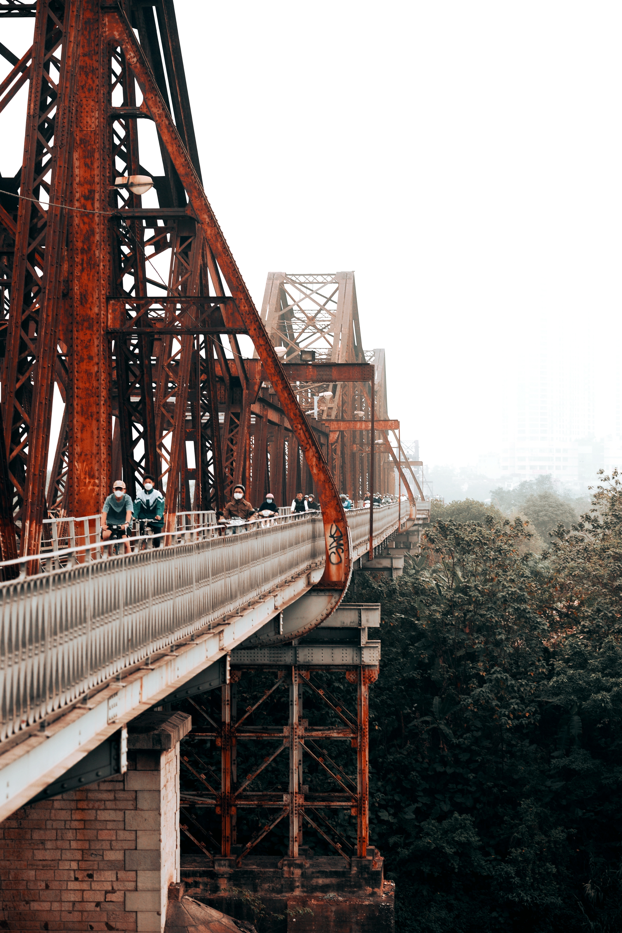 A bridge with people walking on it · Free Stock Photo