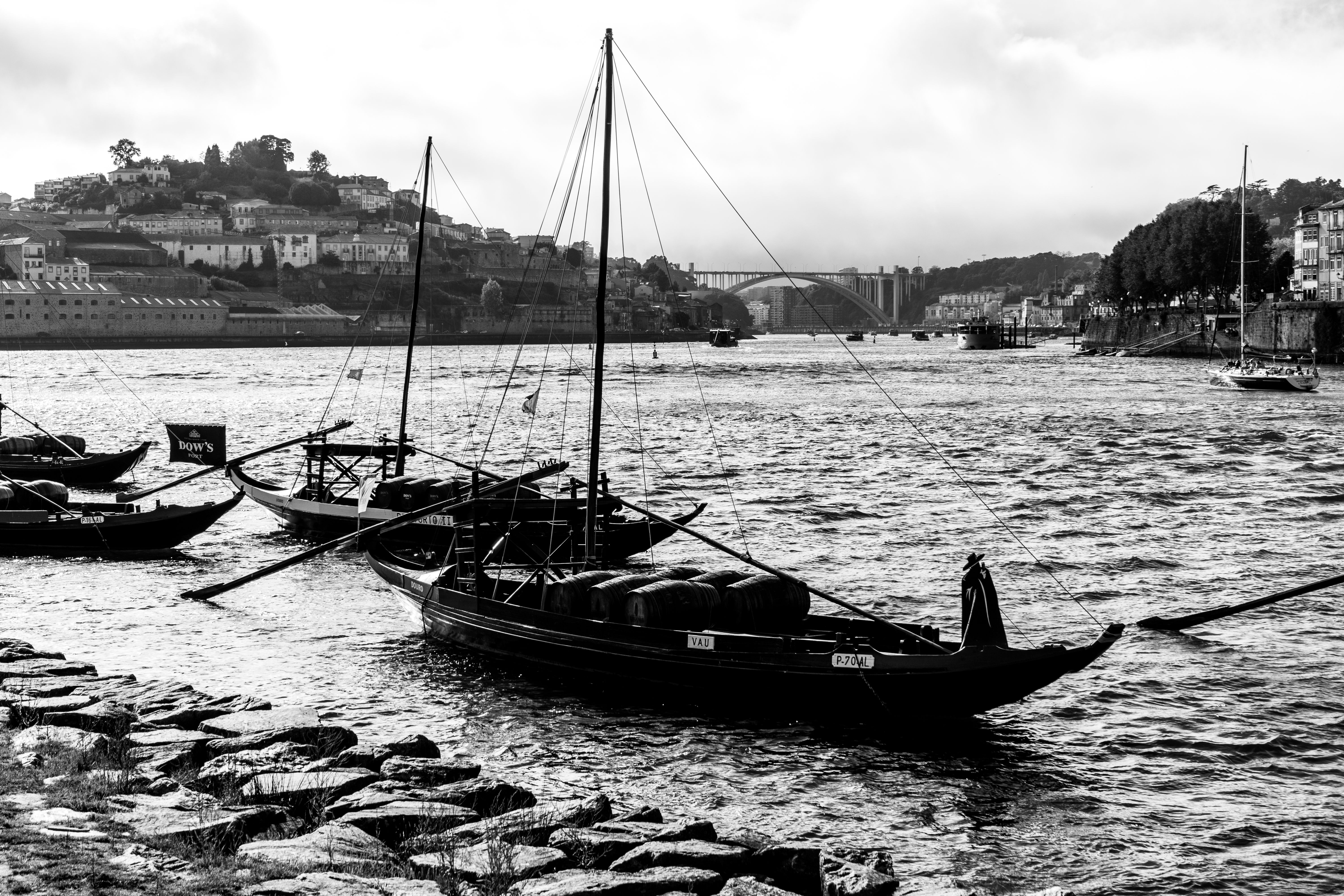 A black and white photo of boats on the water · Free Stock Photo
