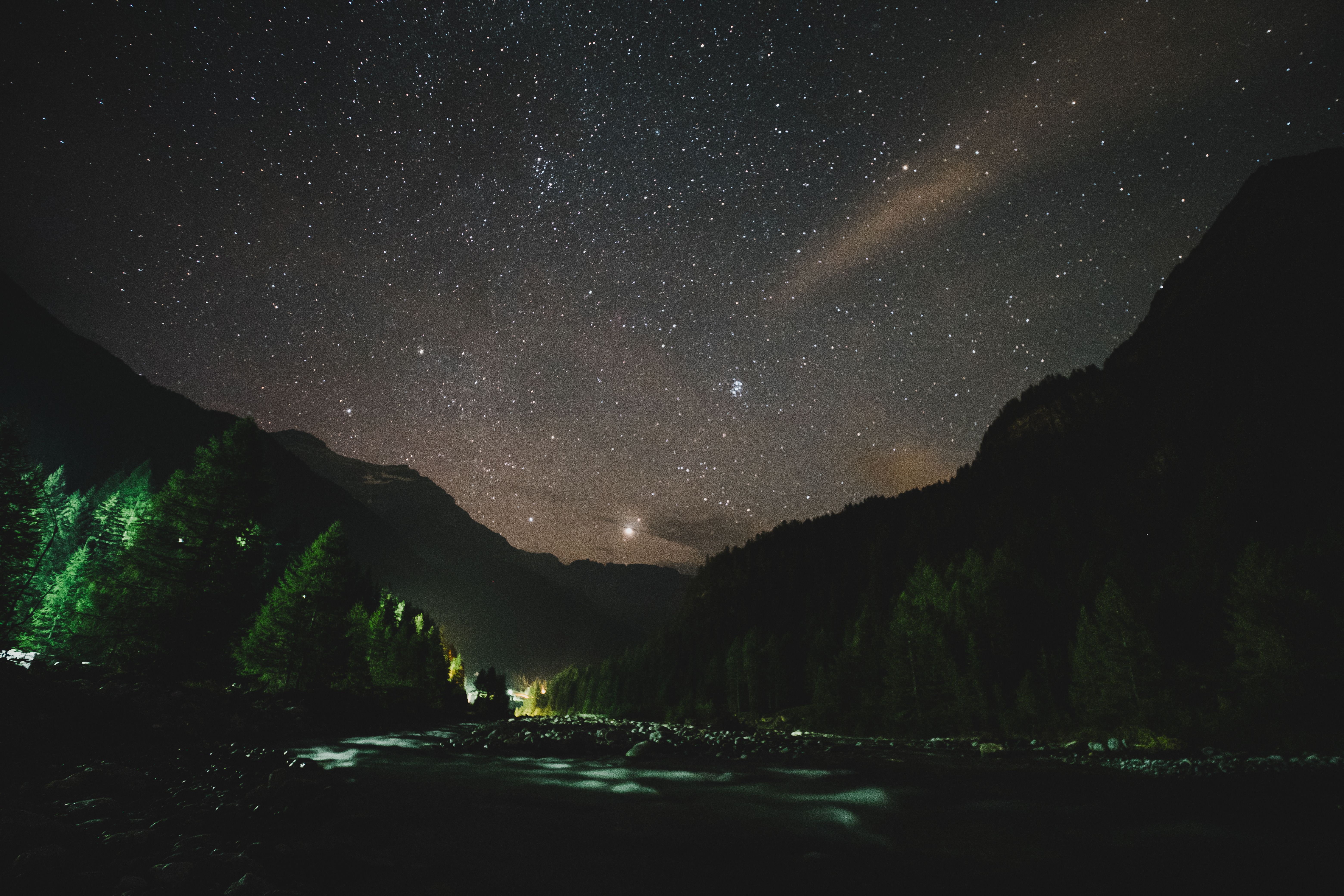 A night sky with stars and a river · Free Stock Photo