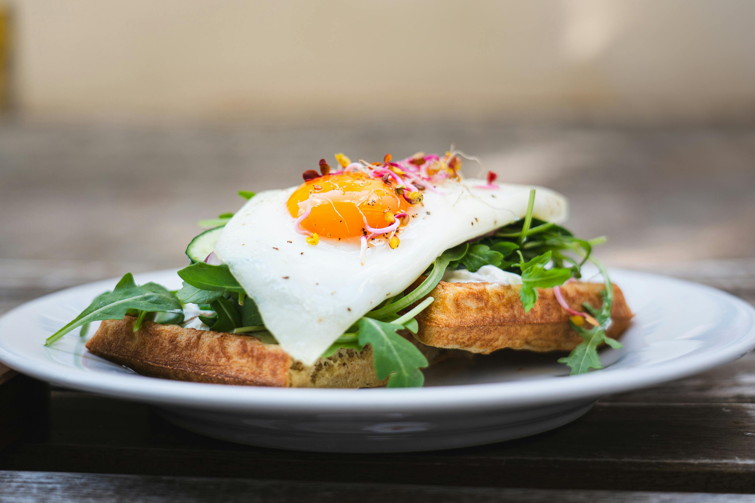 Waffles with egg rocket breakfast · Free Stock Photo