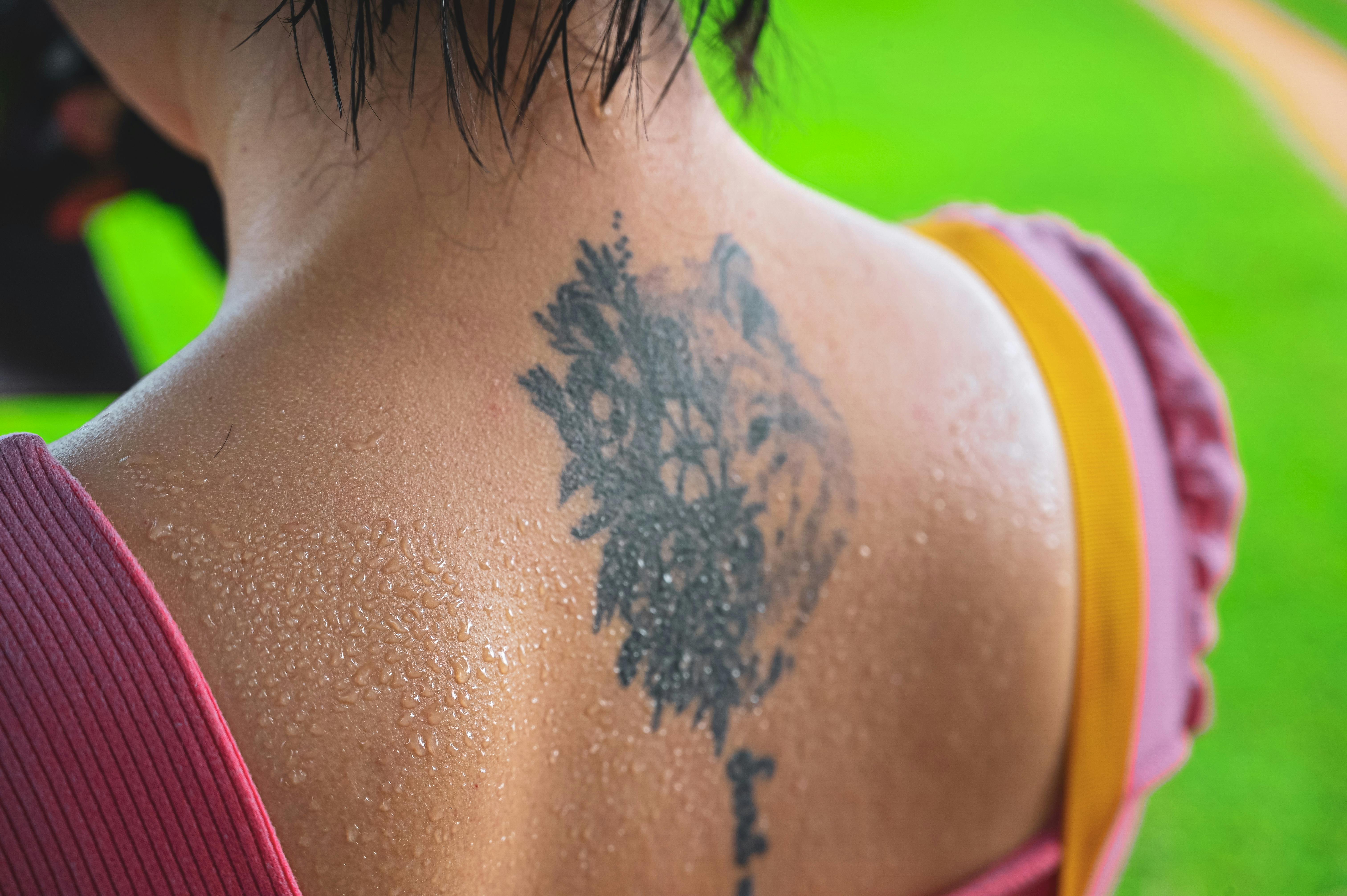 Sweat and wolf tattoo · Free Stock Photo