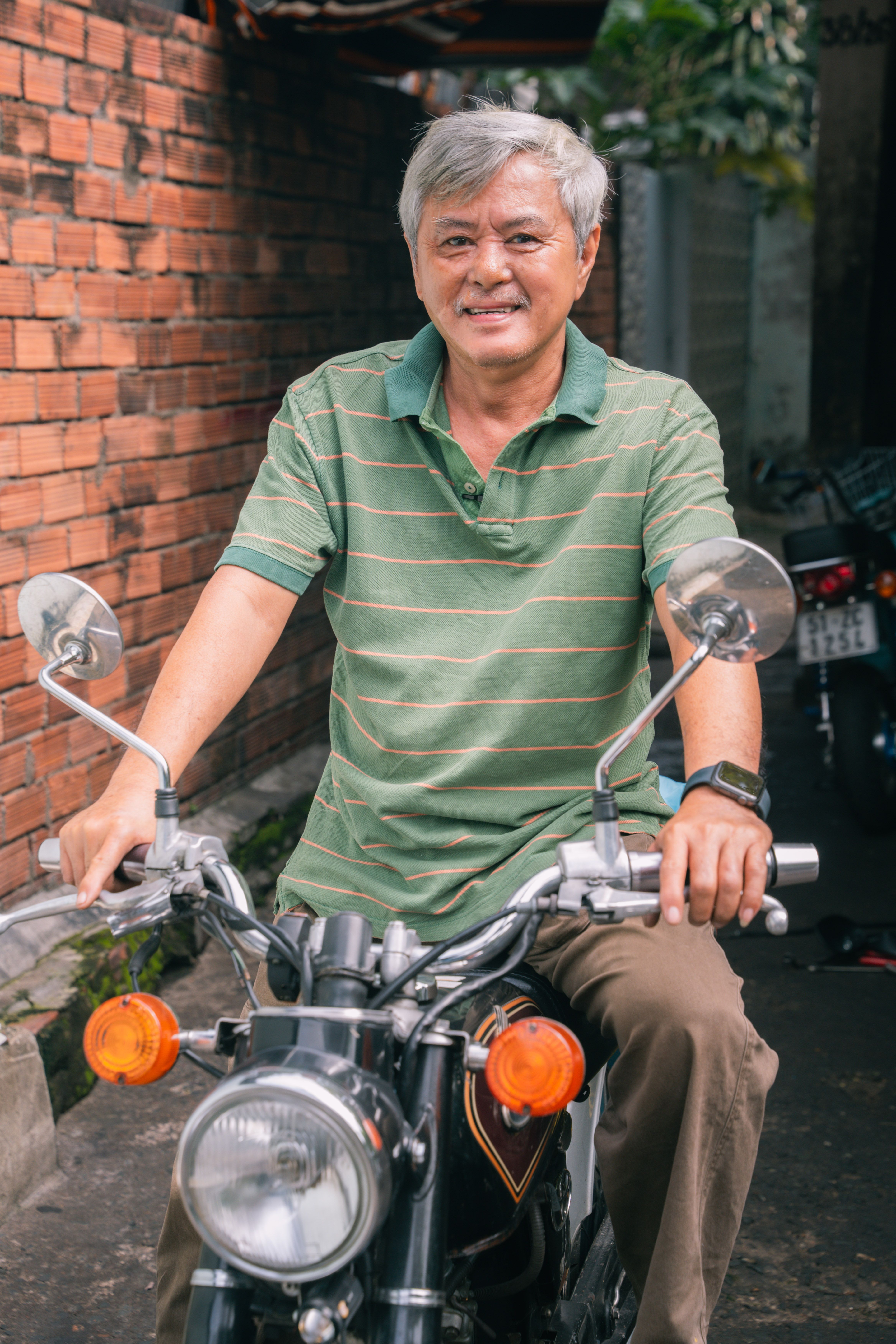 Smiling Senior Man on Classic Motorcycle · Free Stock Photo