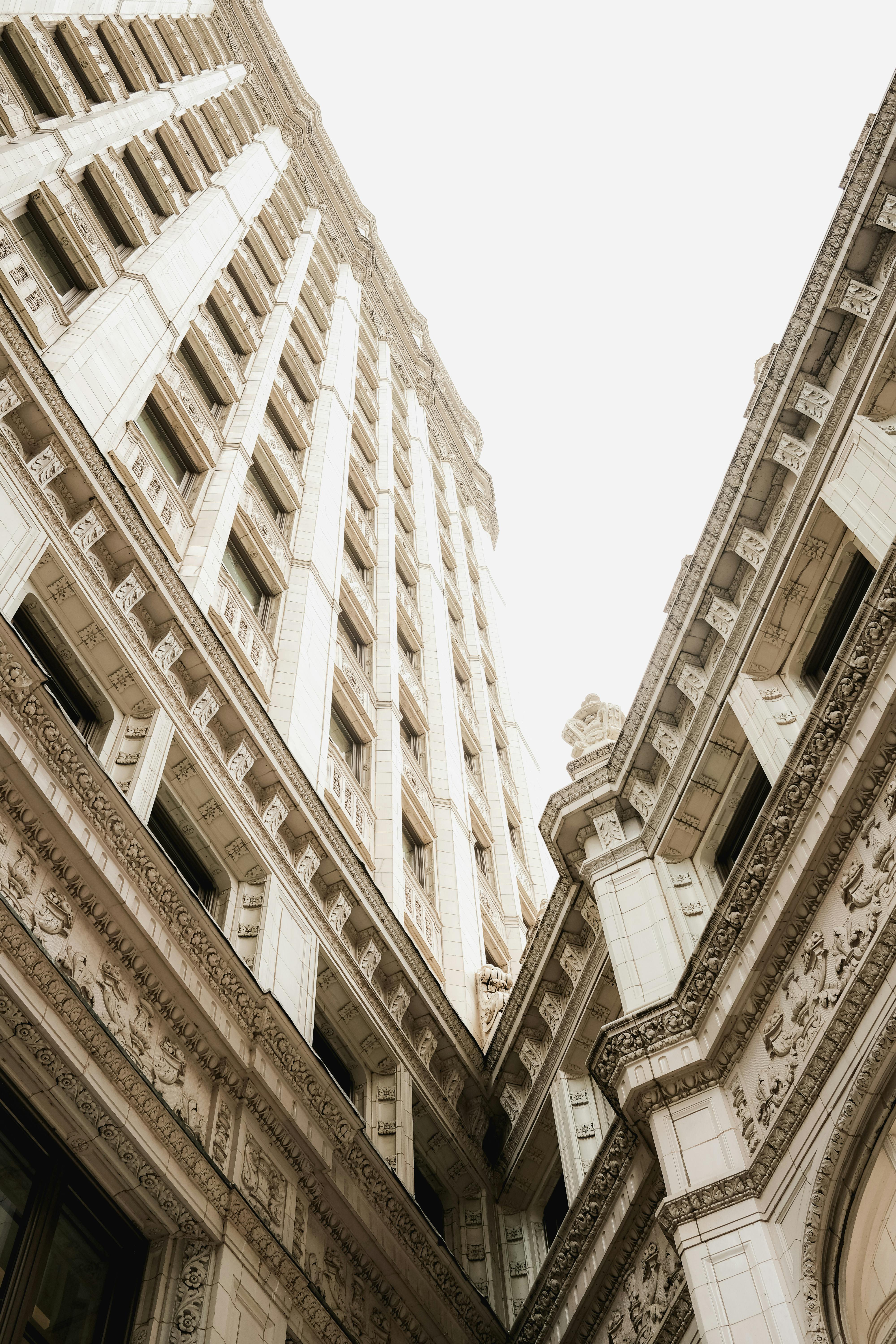 A view of a tall building from below · Free Stock Photo