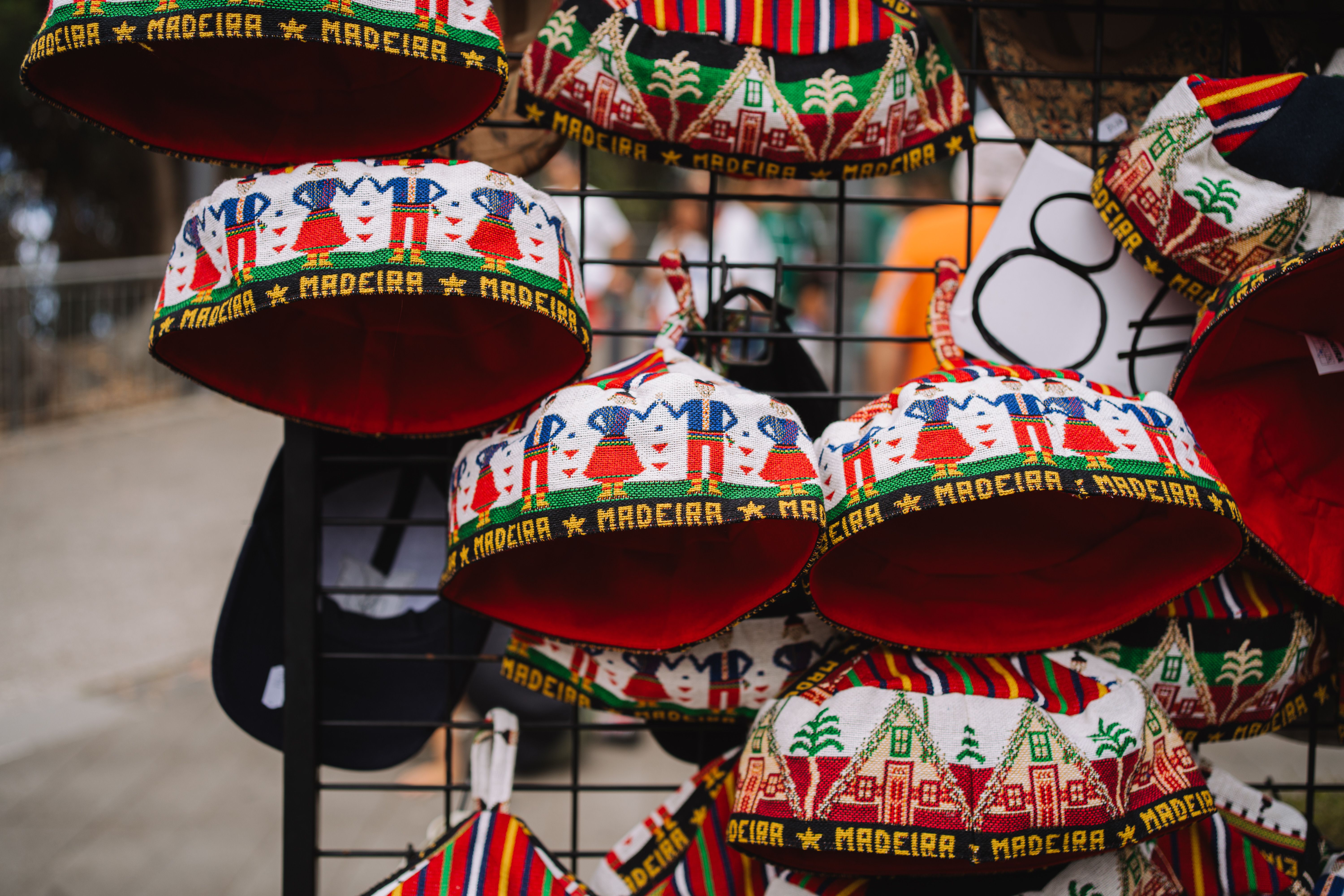 A display of hats on a stand with a sign that says, 'the best hats in ...