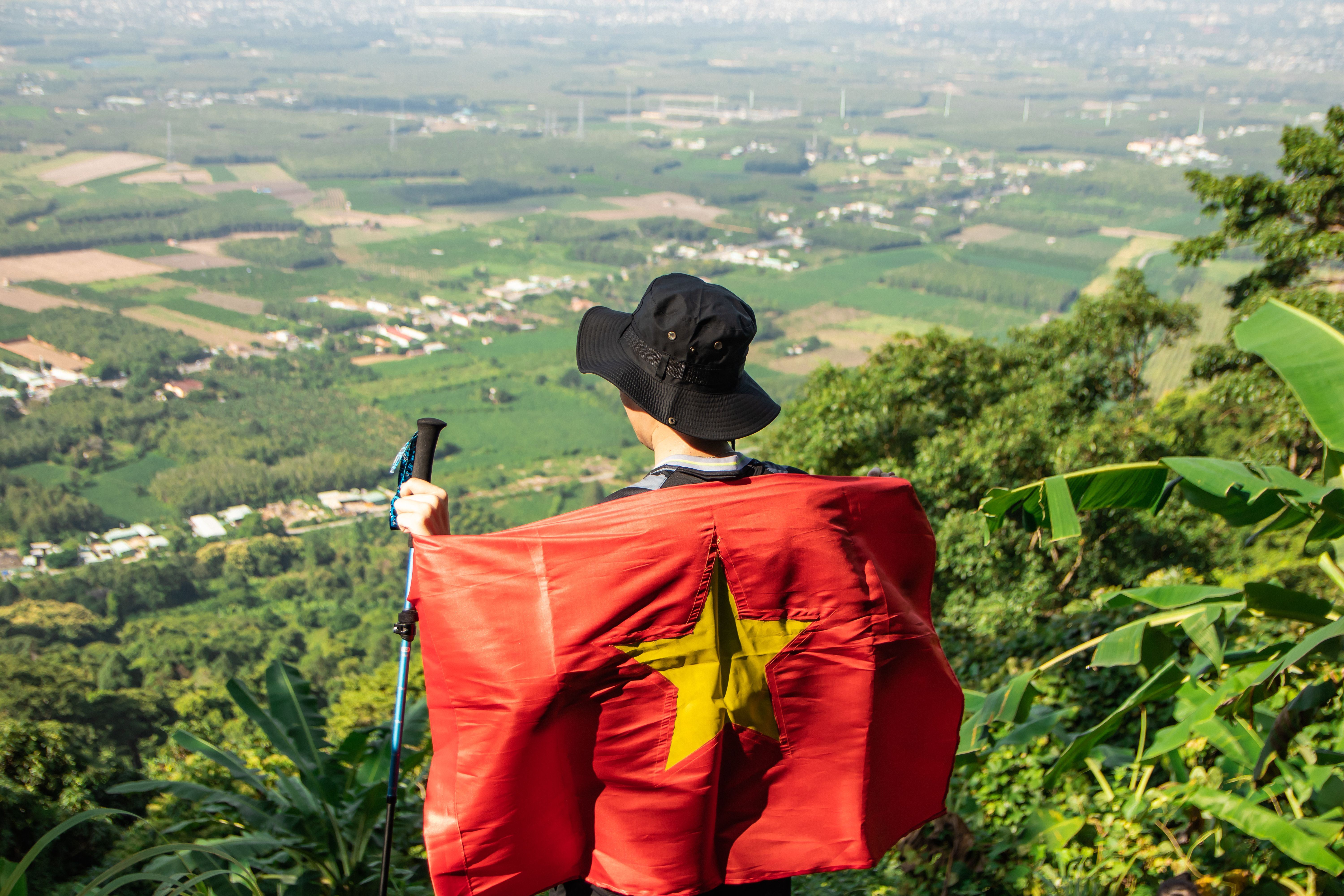 A person with a vietnam flag on their back · Free Stock Photo
