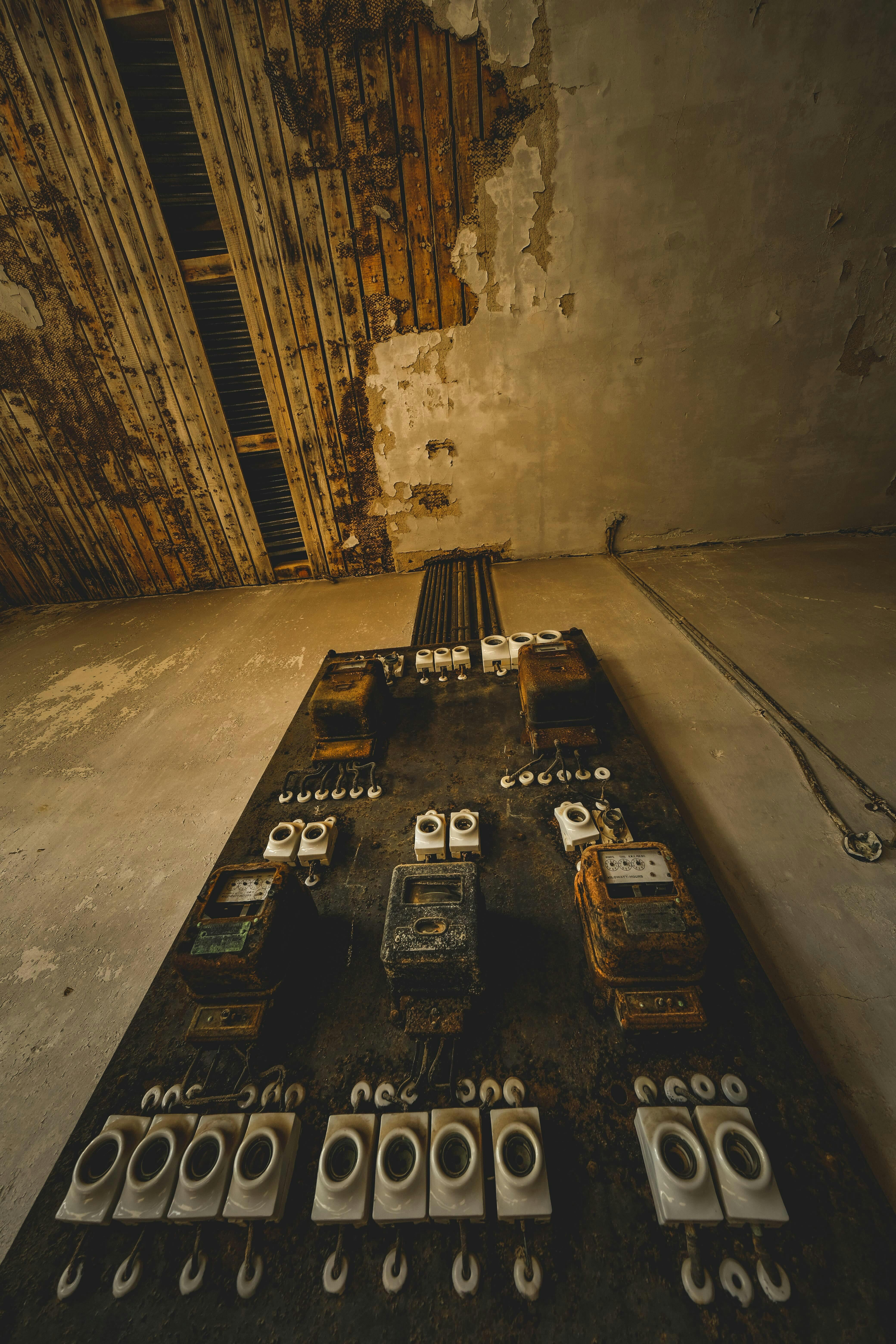 An old electrical panel with wires and switches · Free Stock Photo