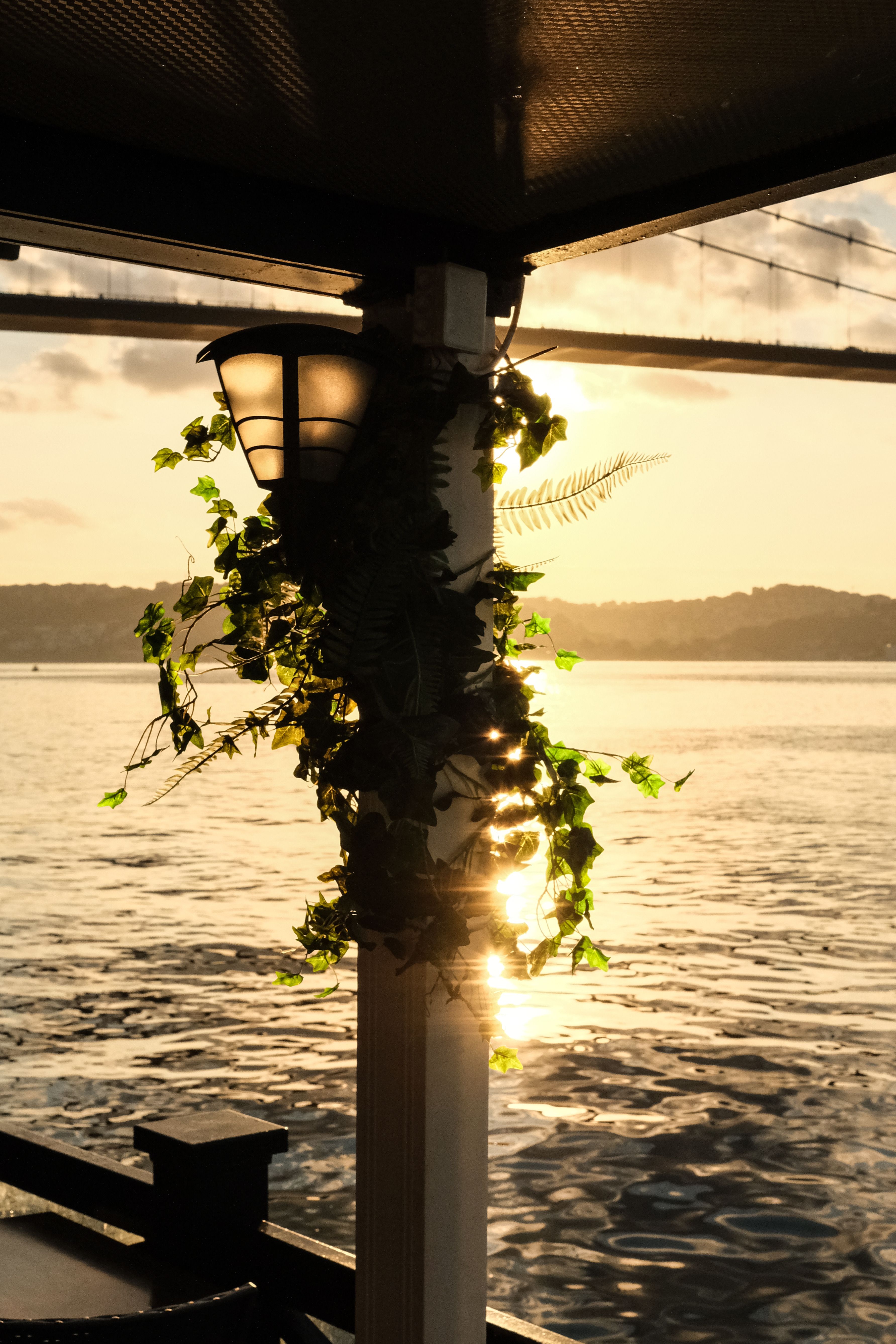 A boat with a lantern hanging from the side · Free Stock Photo