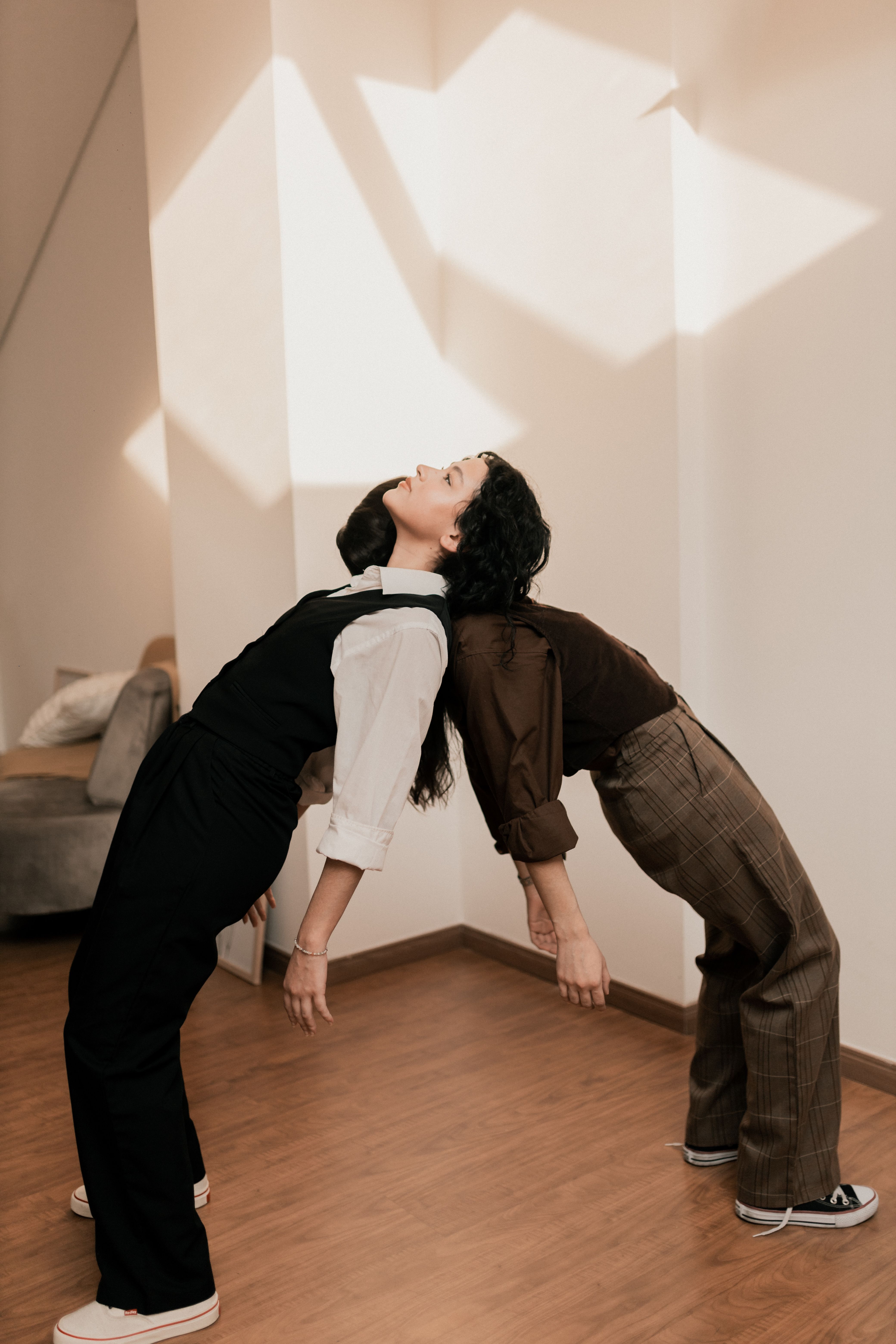 Two people doing a dance in a room · Free Stock Photo