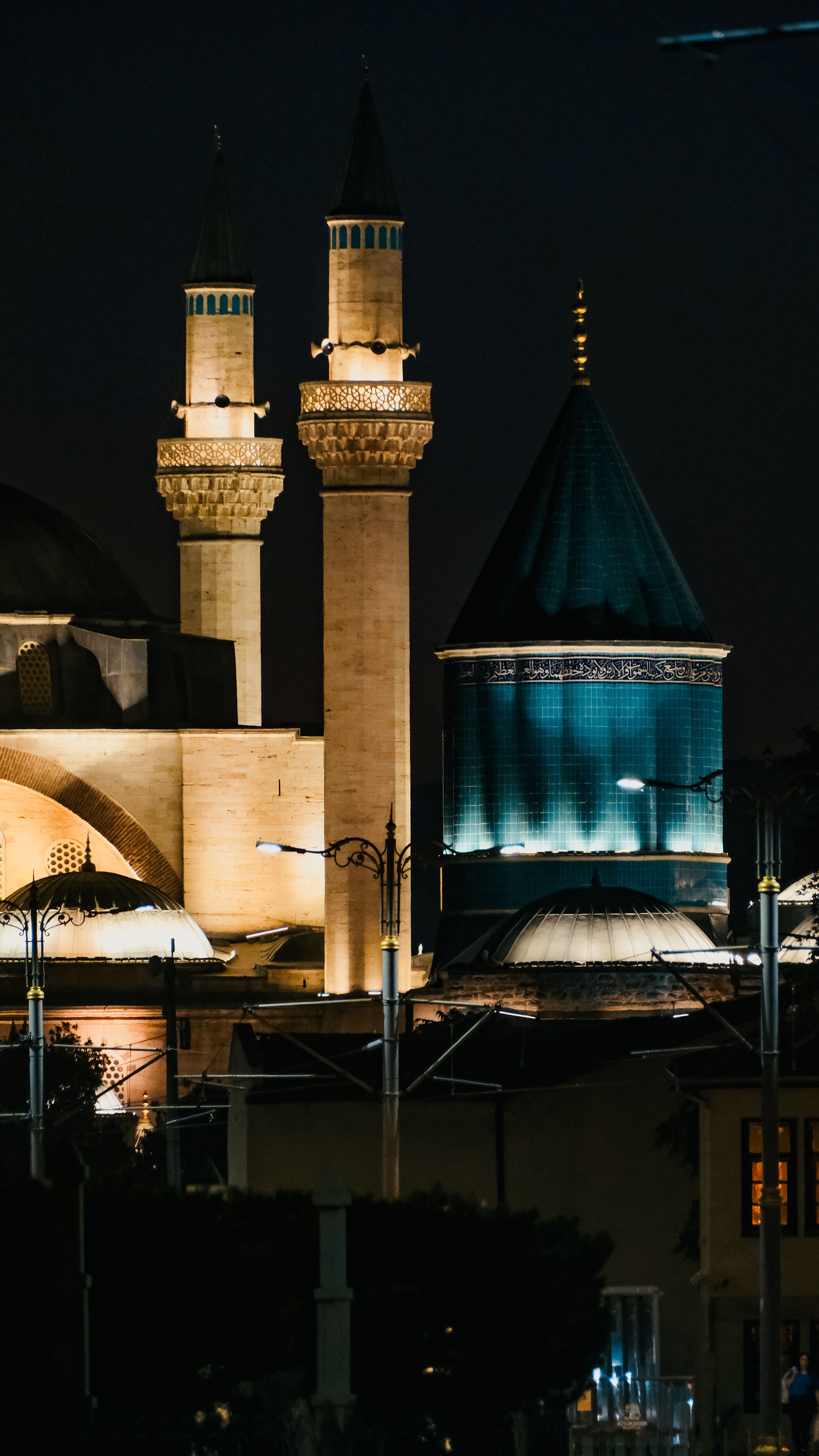 A night view of a mosque with blue lights · Free Stock Photo