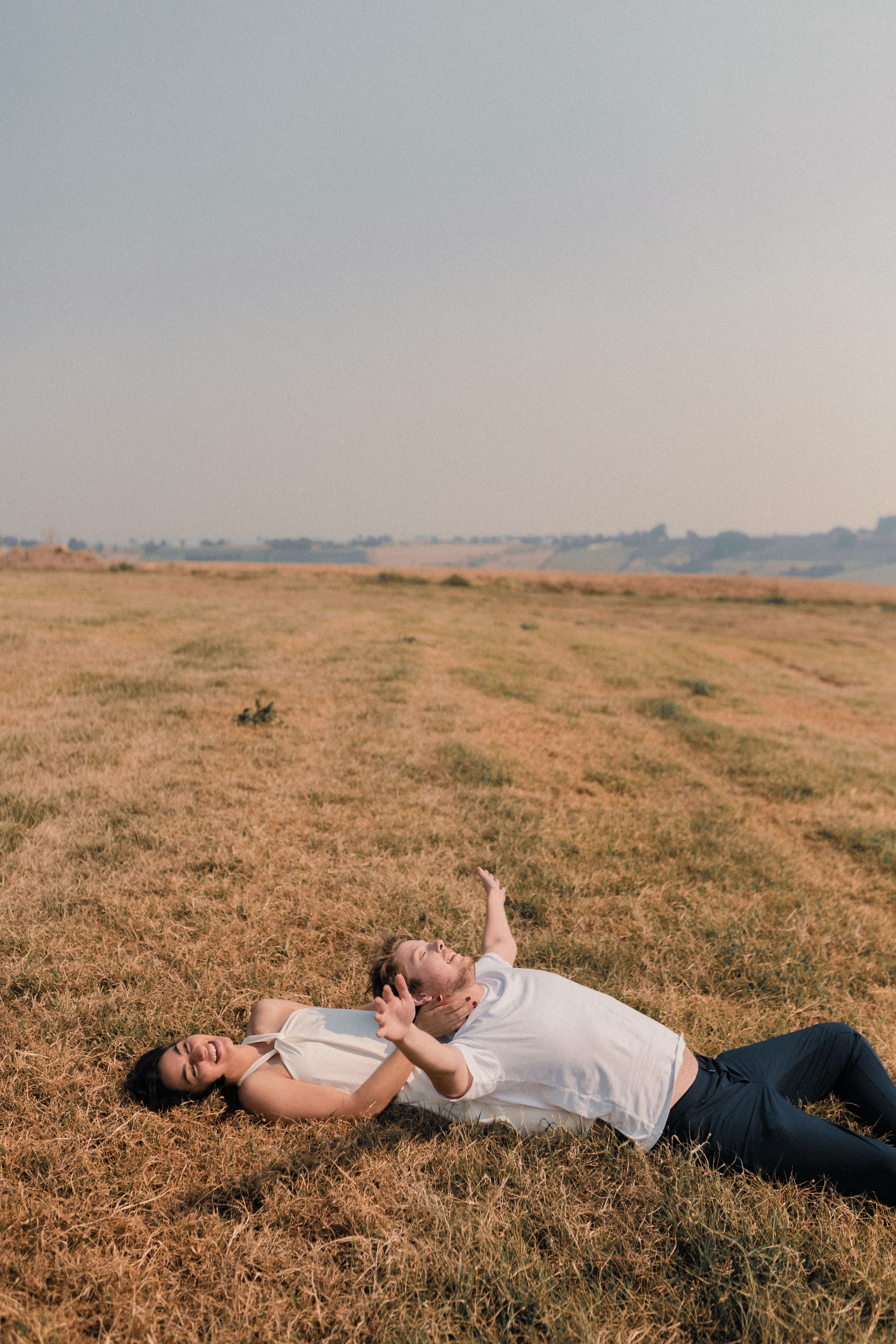Woman Laying on Field of Green Grass · Free Stock Photo