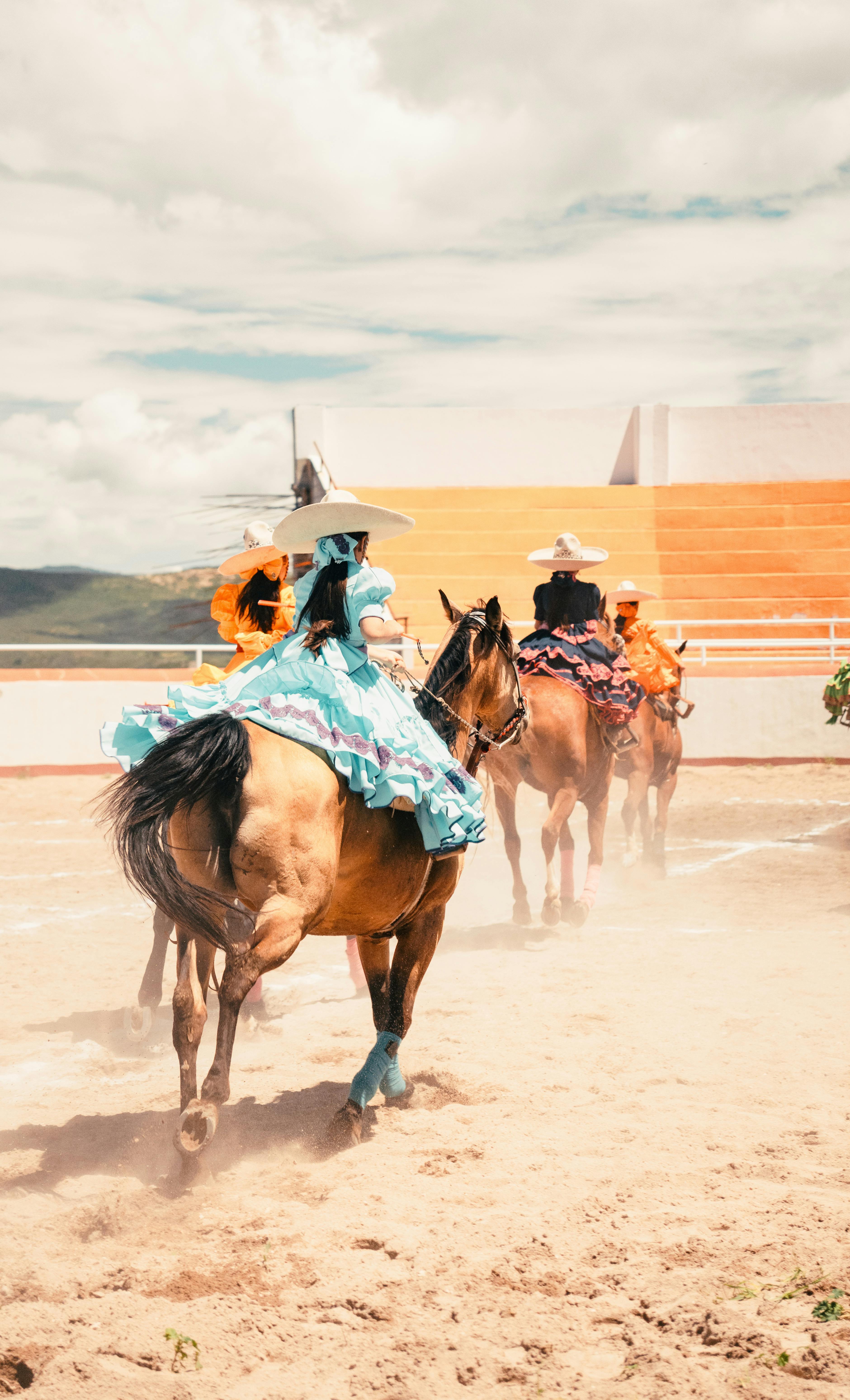 Two women riding horses in a rodeo · Free Stock Photo