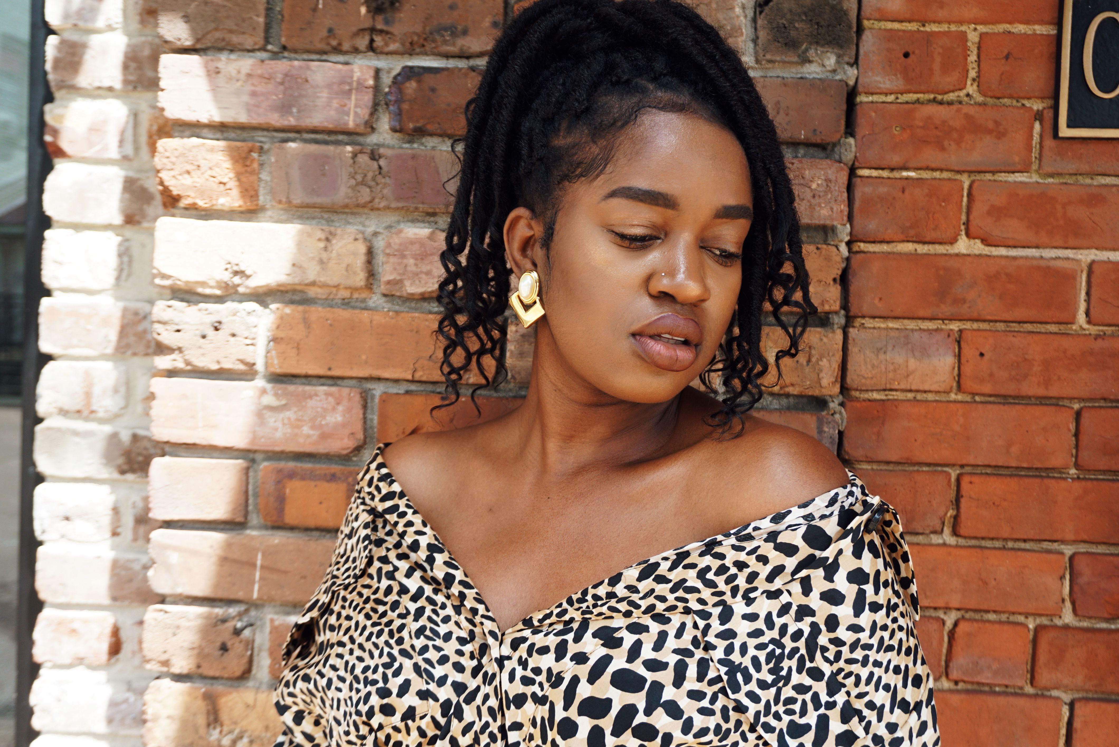 Woman Wearing Leopard Print Top · Free Stock Photo