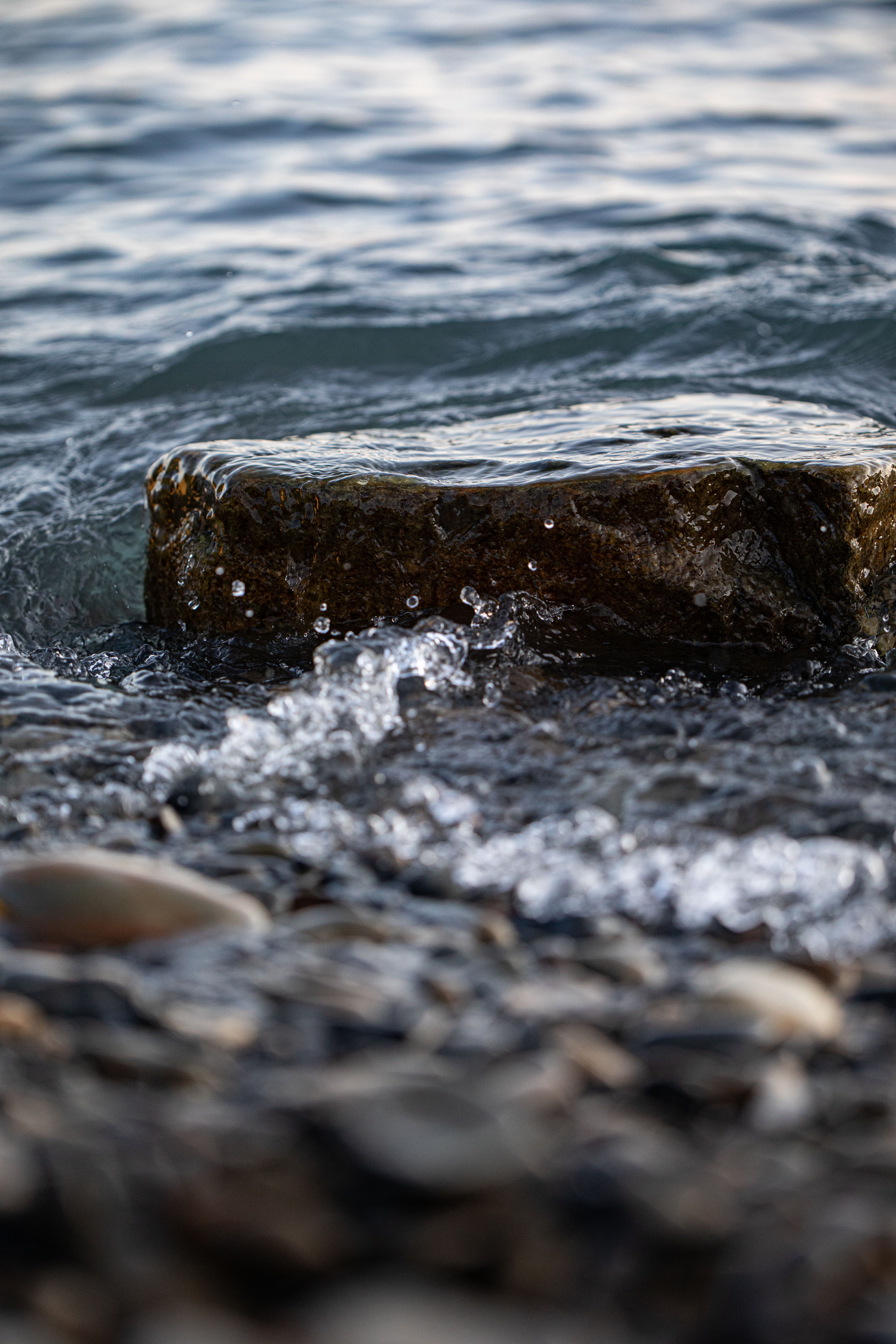 Rocks on Body of Water · Free Stock Photo