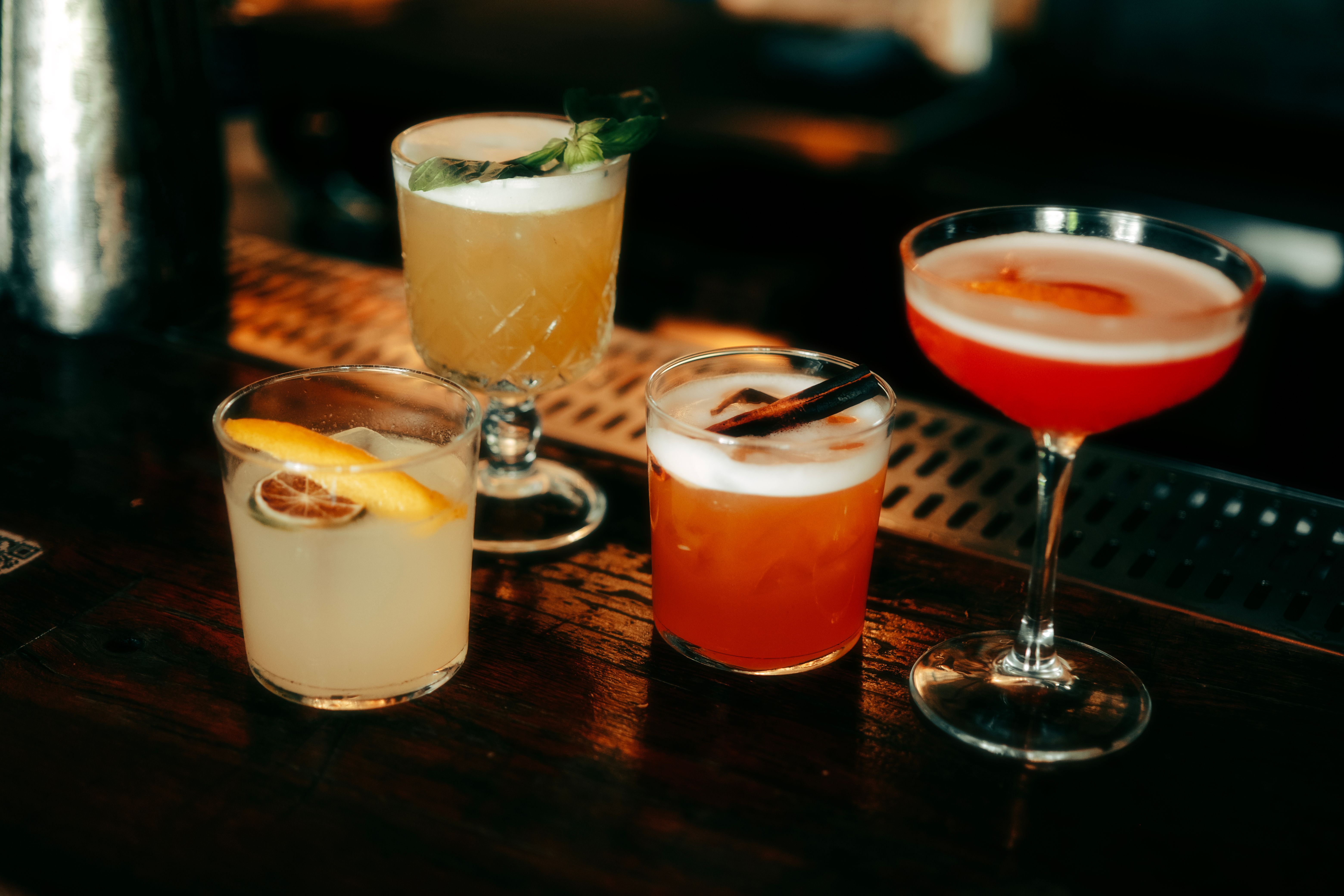 A selection of cocktails on a bar · Free Stock Photo