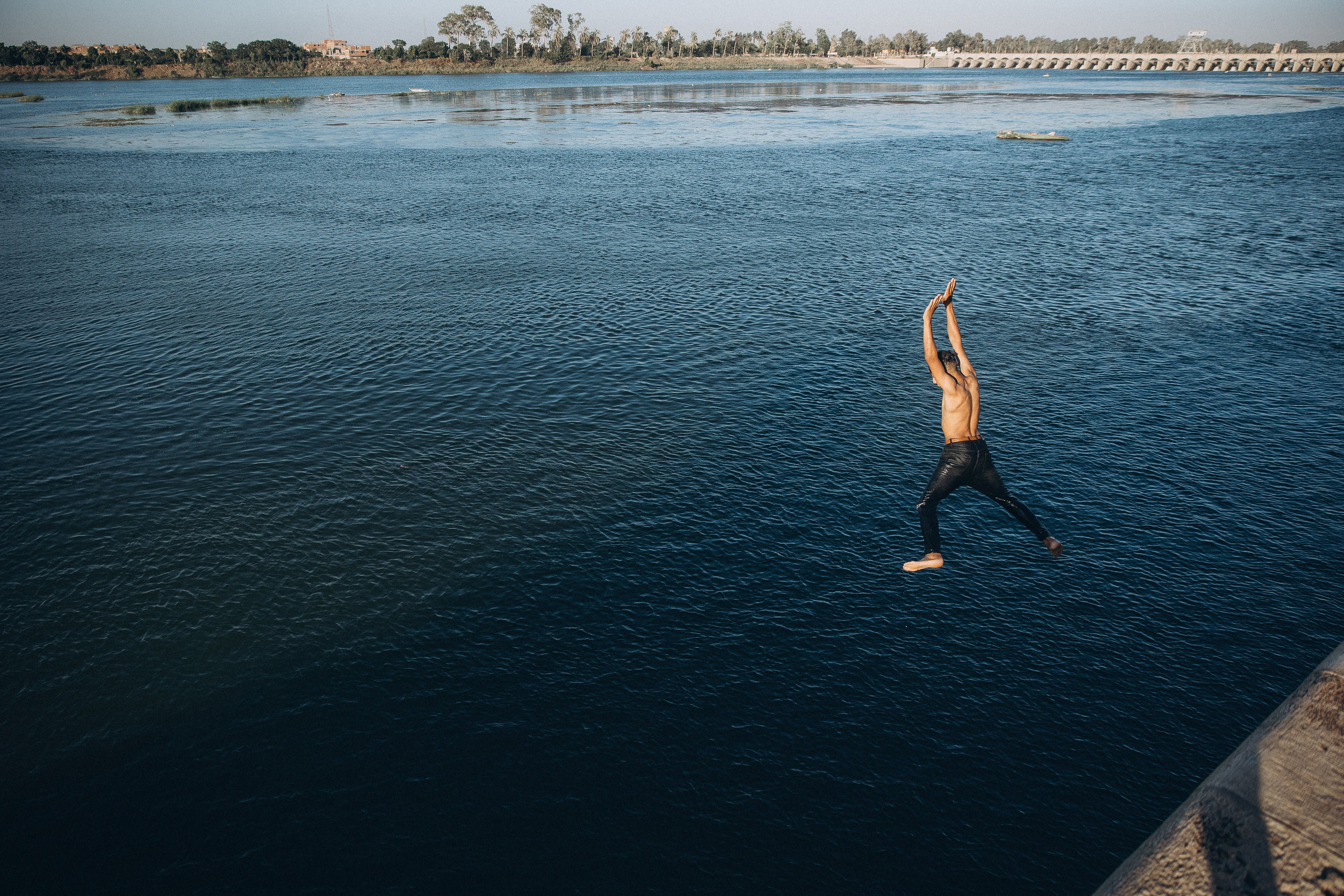 jumping into the nile river · Free Stock Photo