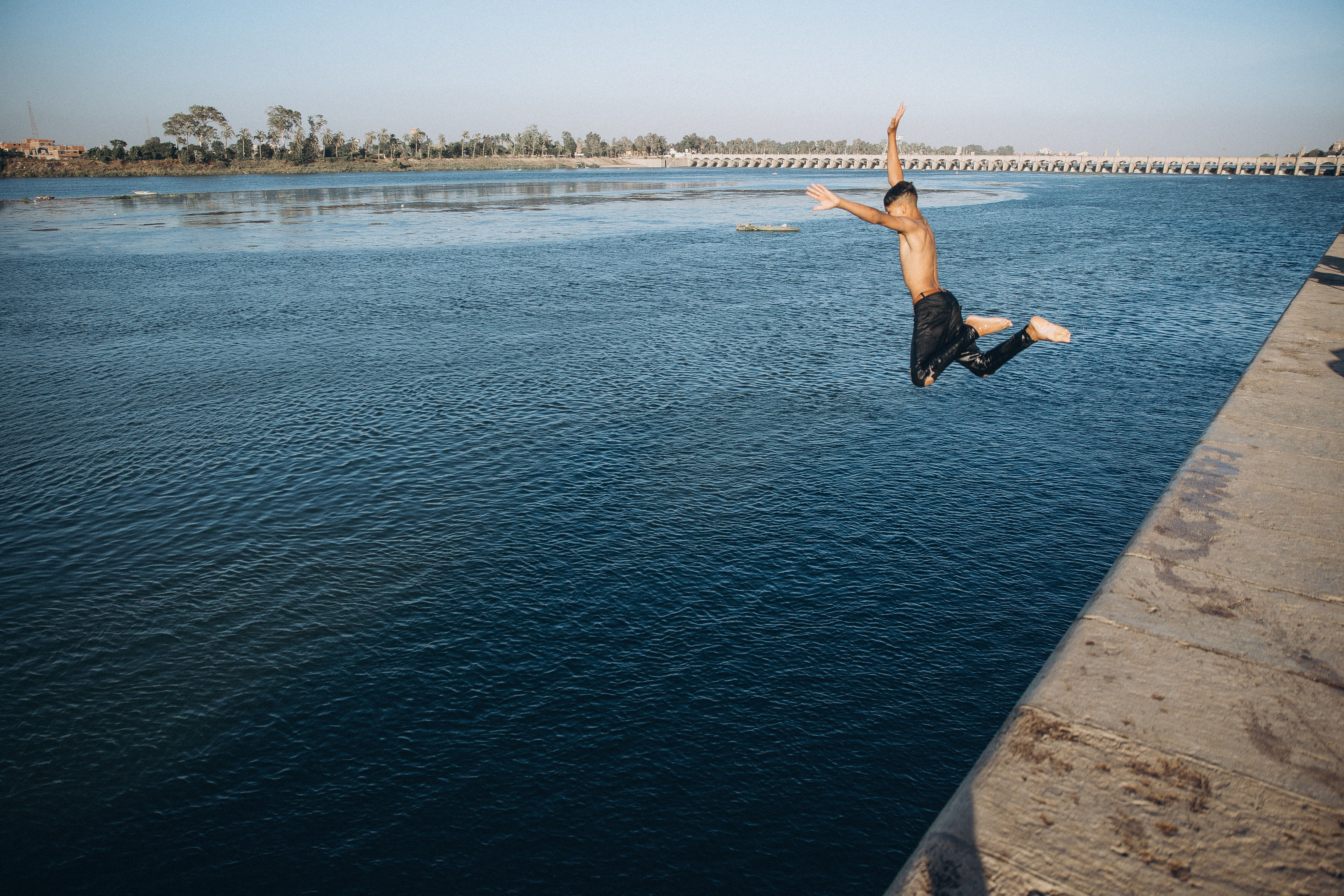 jumping into the nile river · Free Stock Photo