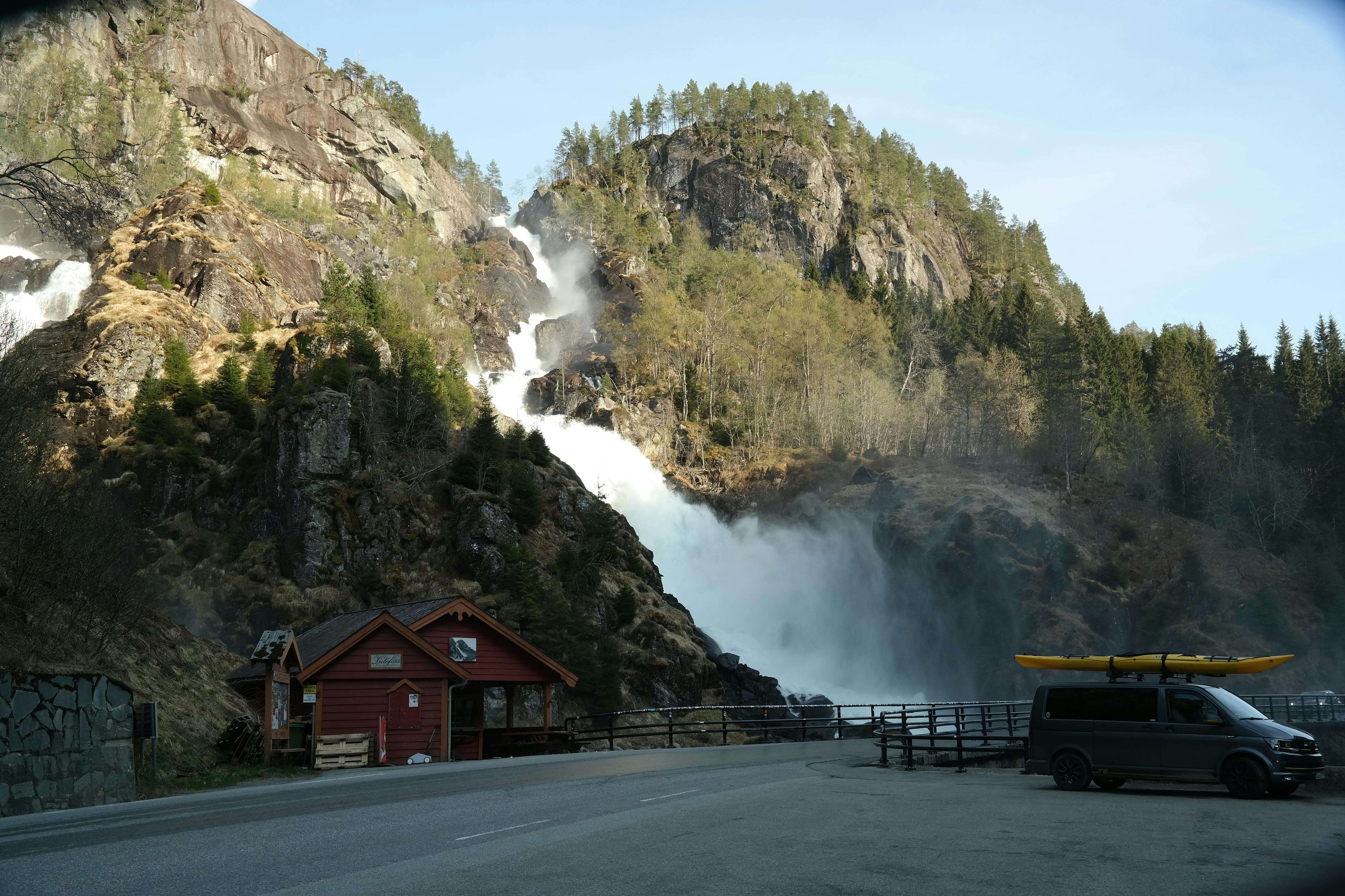 A car parked in front of a waterfall · Free Stock Photo