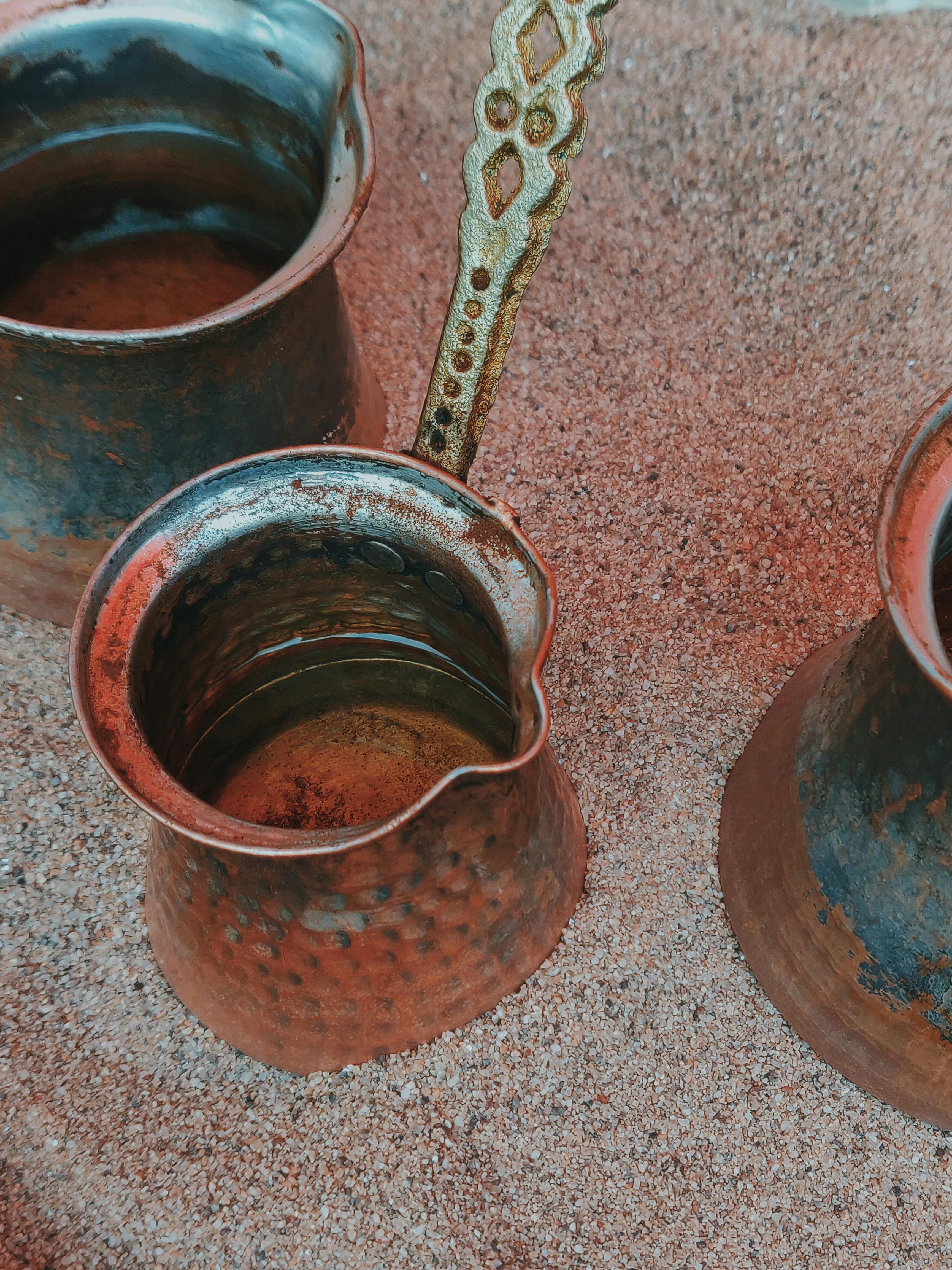 Gray Iron Cast Cups Close-up Photography · Free Stock Photo
