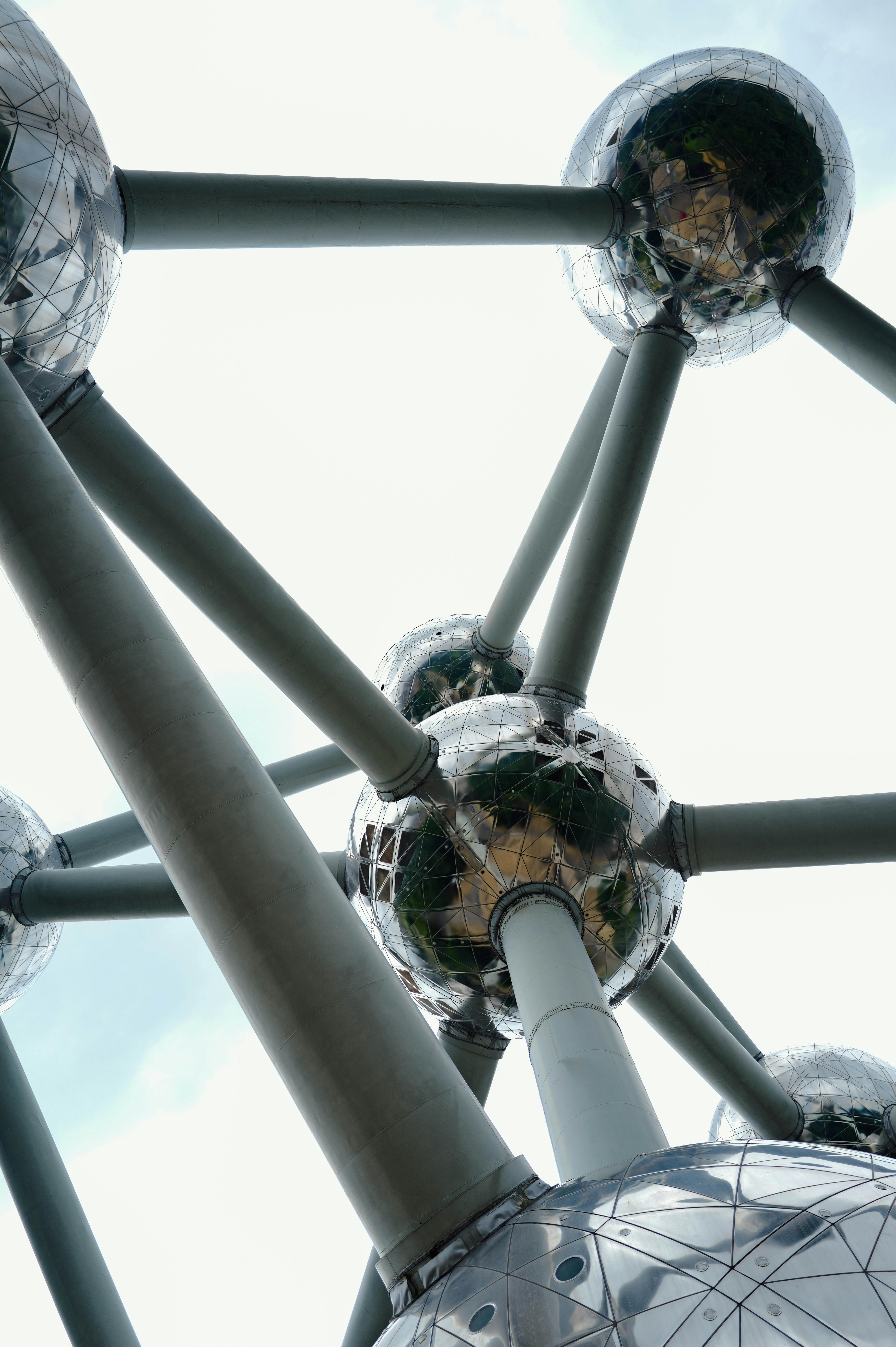 The top of a tall building with many spheres · Free Stock Photo