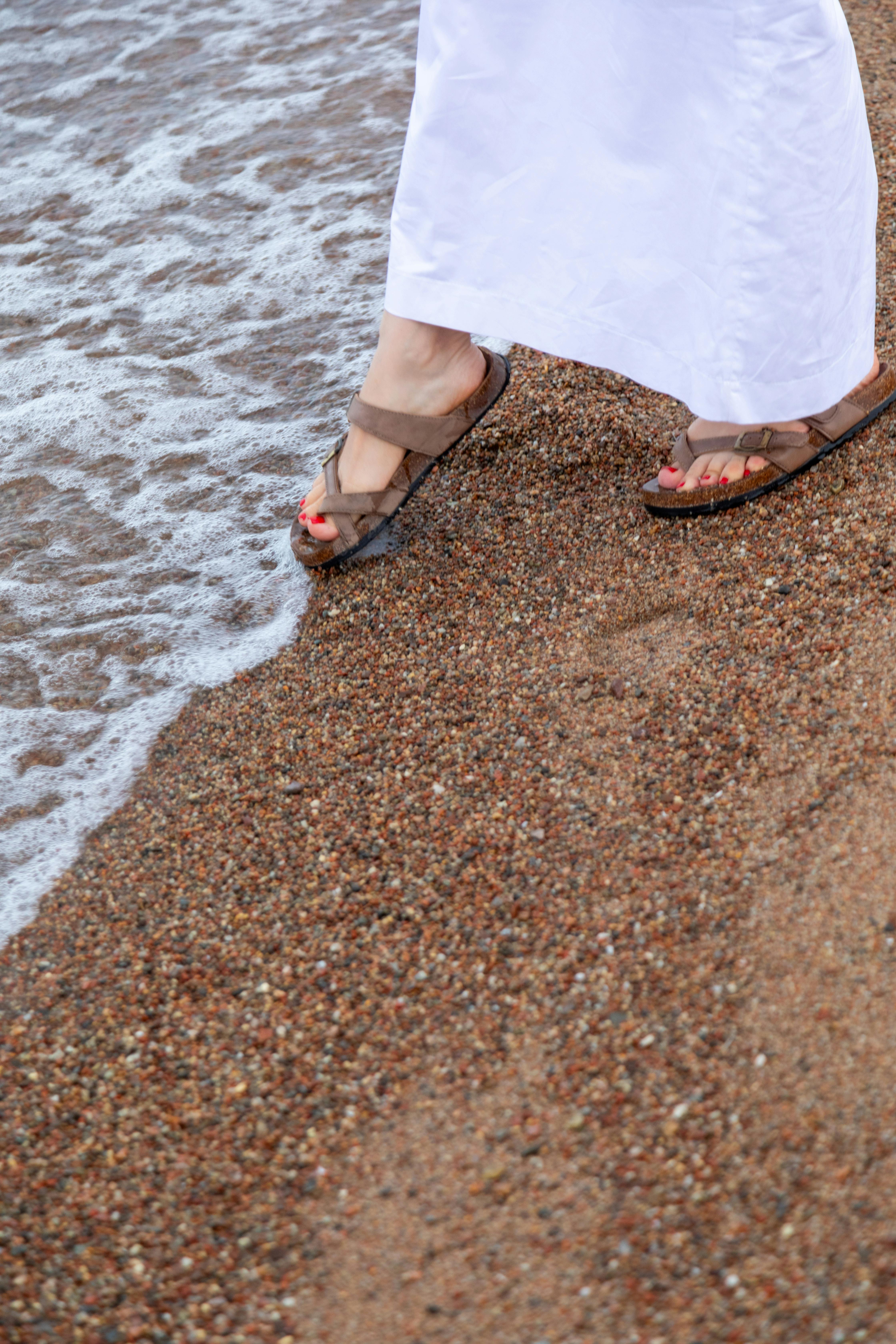 Photography of a Person Wearing Sandals · Free Stock Photo