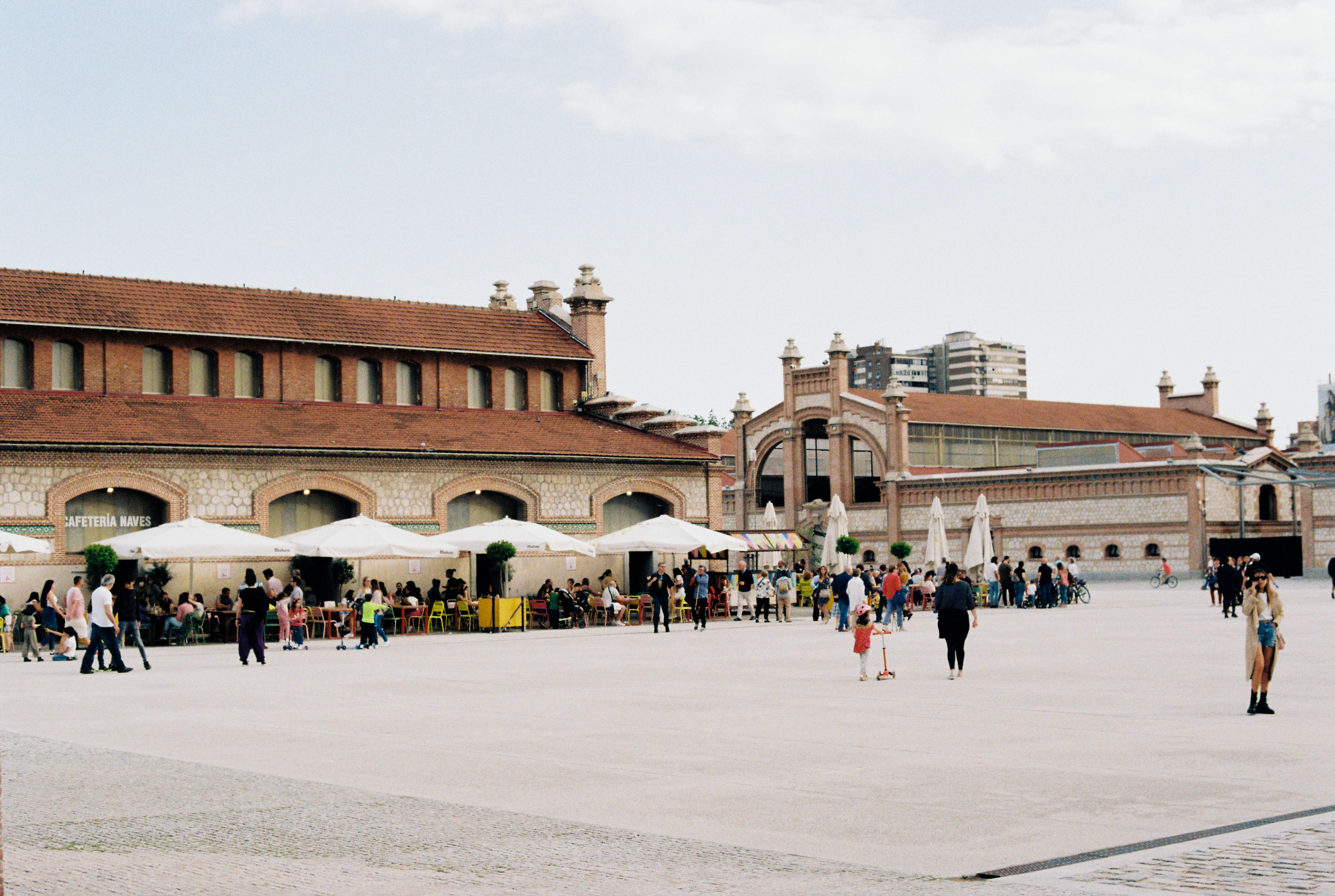 A large square with people walking around · Free Stock Photo