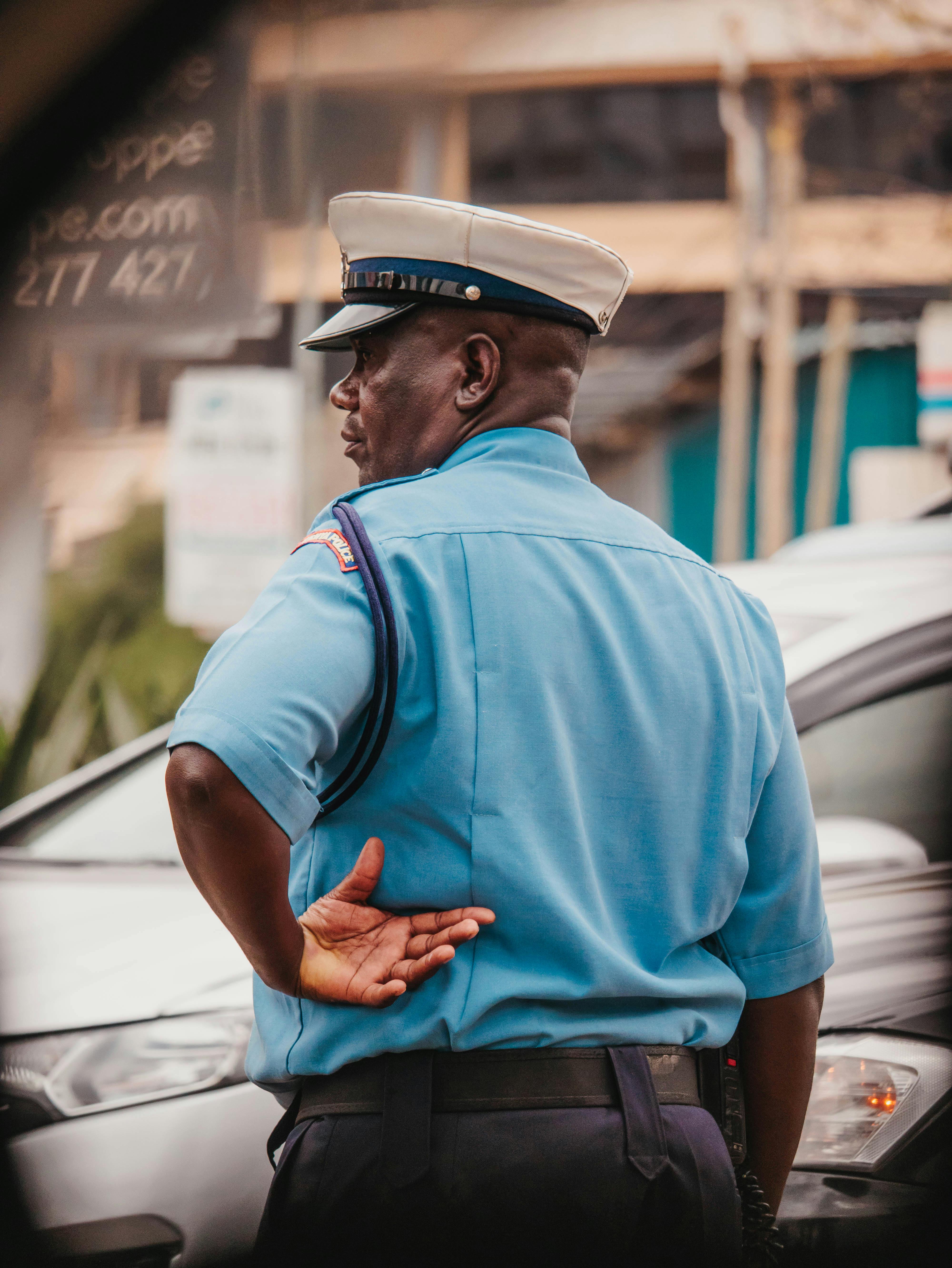 Police Officer Directing Traffic · Free Stock Photo
