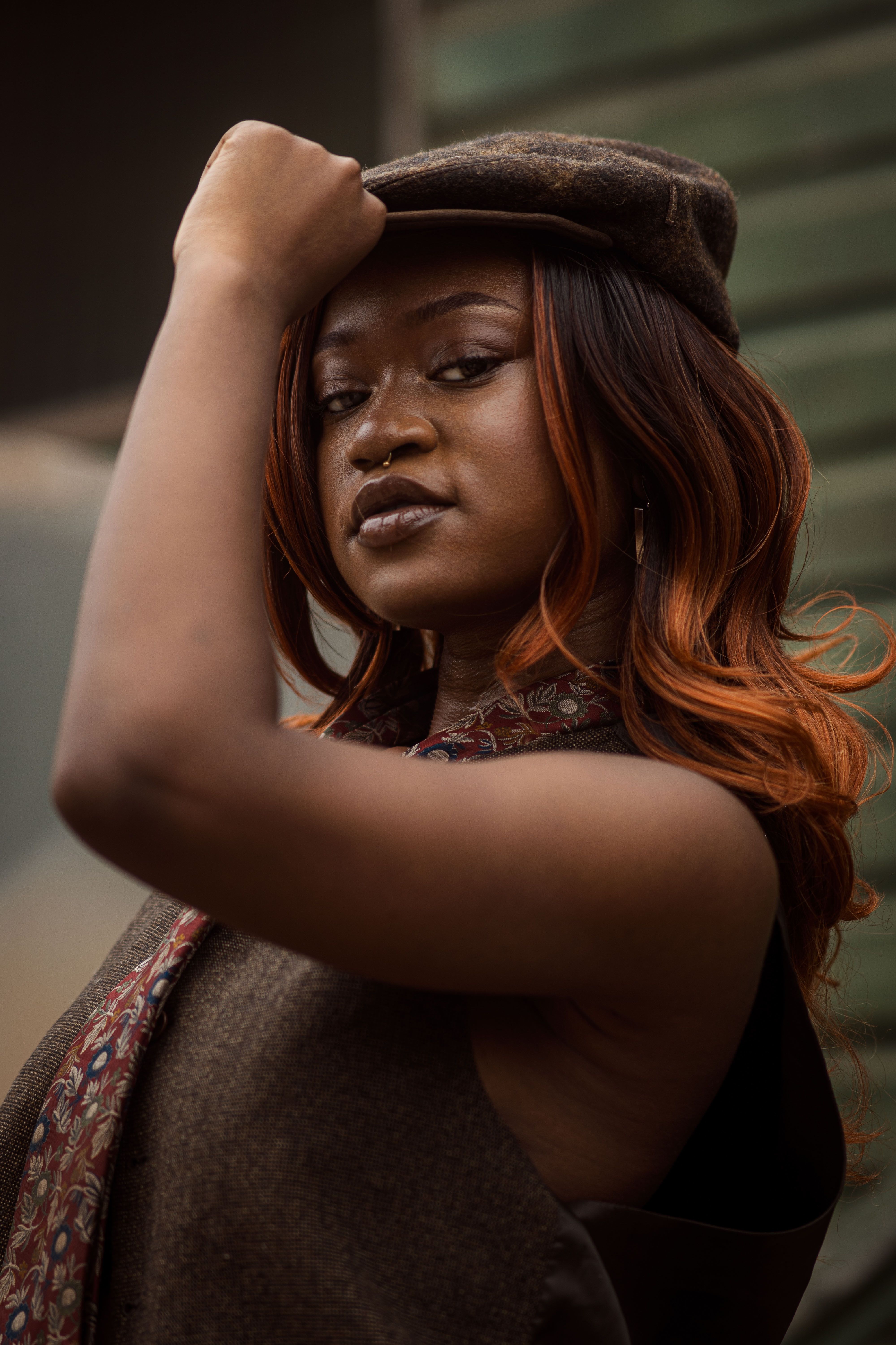 Model in Gray Waistcoat and Necktie Adjusting Her Flat Cap · Free Stock ...