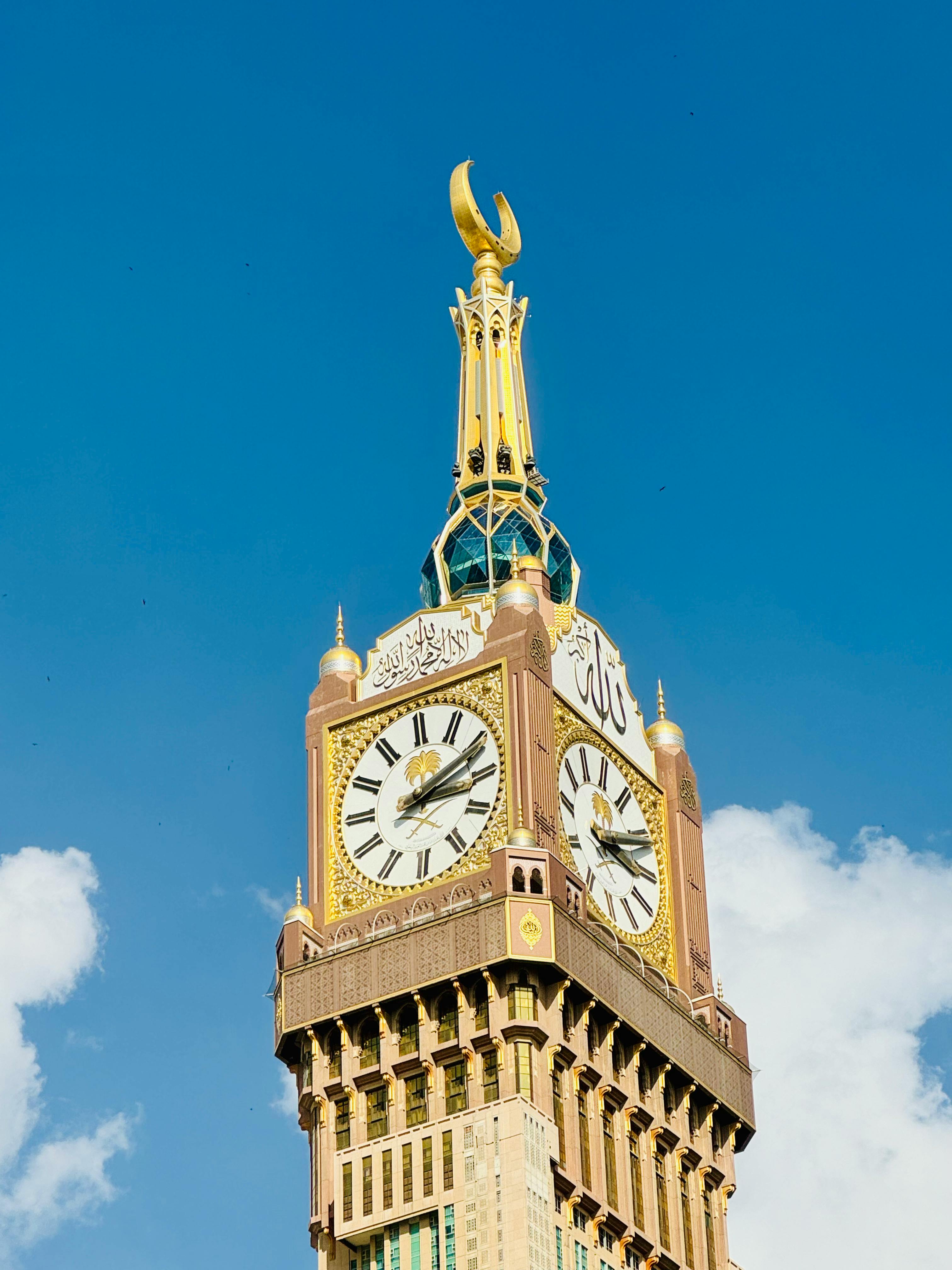 Photo of an Illuminating Makkah Royal Clock Tower at Night, Mecca ...